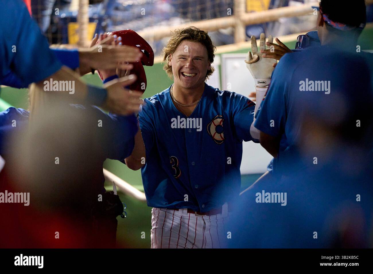Clearwater Threshers Carter Mathison (3) high fives teammates after ...