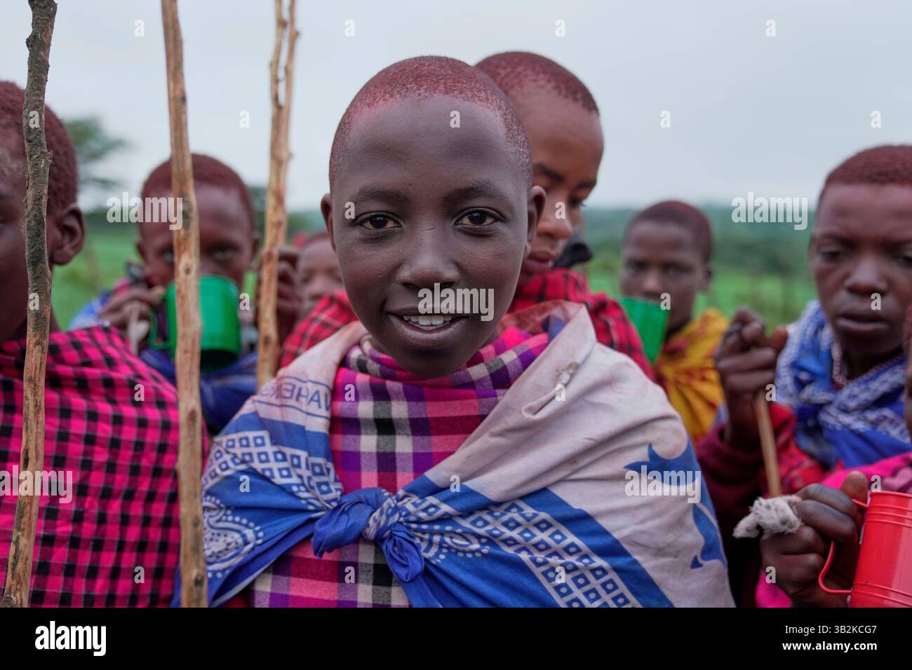 Isaac Mpusia, 16 years old, of the Maasai tribe poses for a photo ...