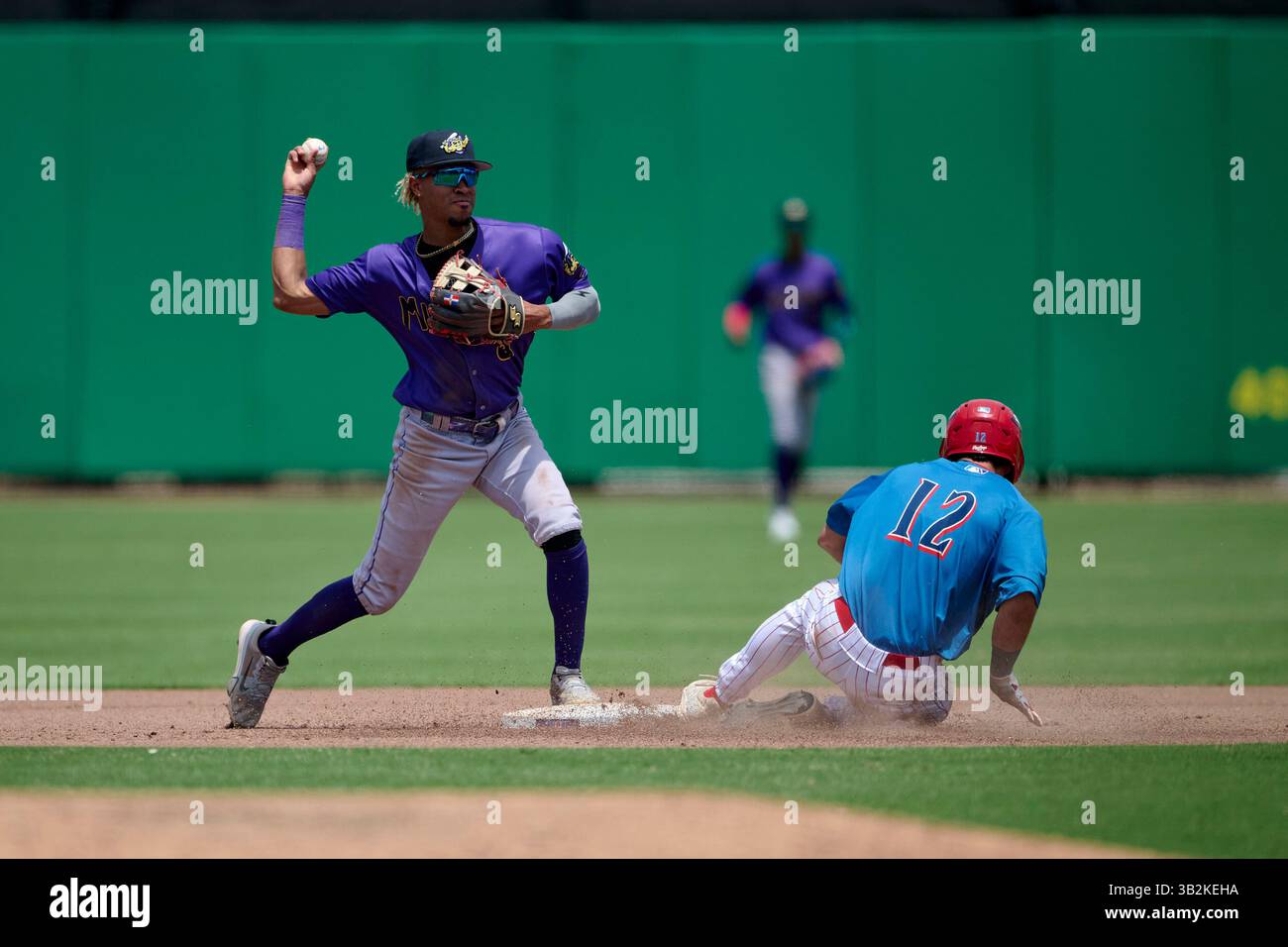 Fort Myers Mighty Mussels shortstop Angel Del Rosario (8) turns a ...