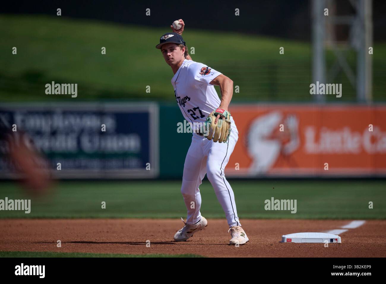 Lakeland Flying Tigers shortstop Bryce Rainer (27) throws to first base ...