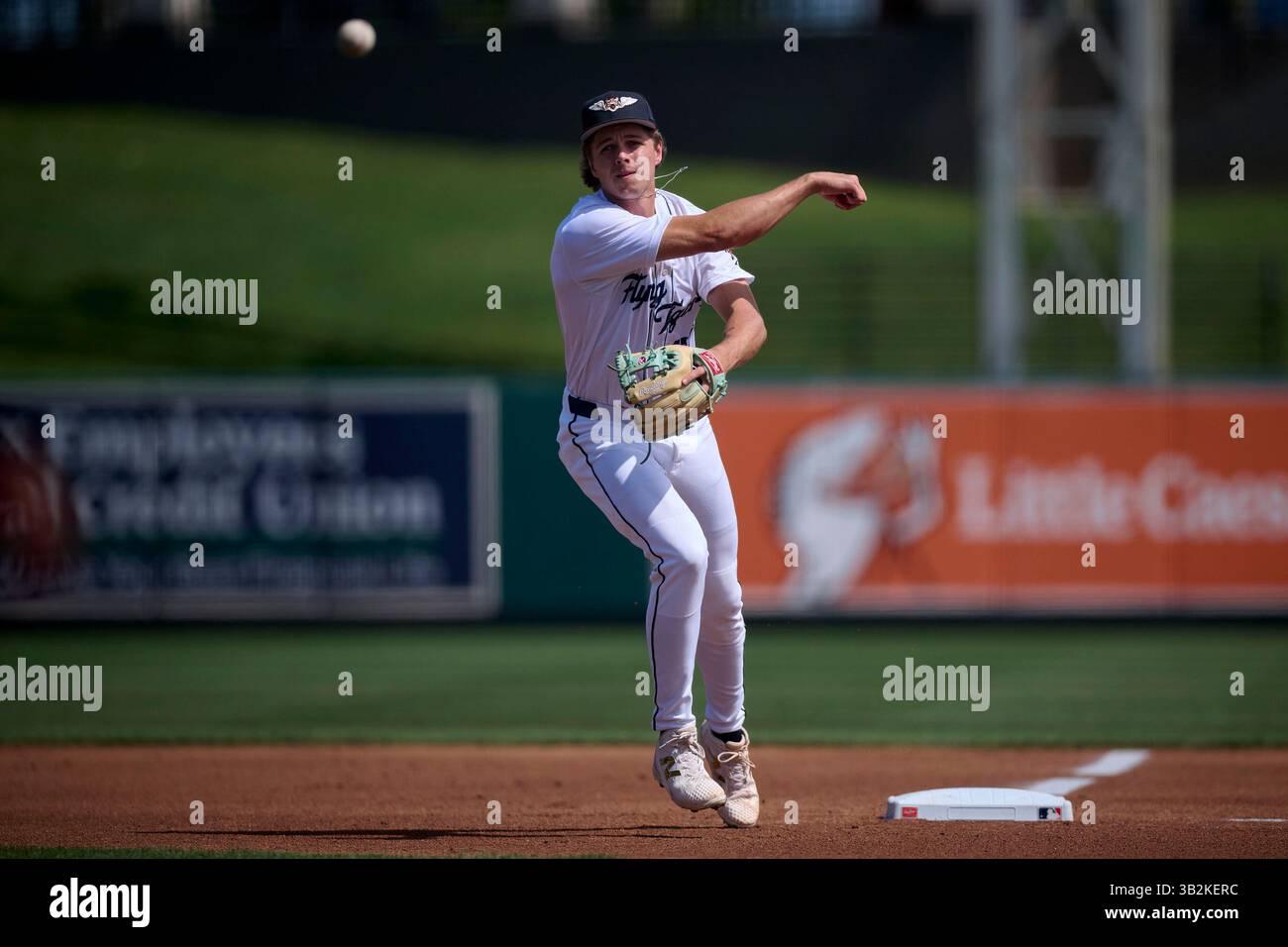 Lakeland Flying Tigers shortstop Bryce Rainer (27) throws to first base ...