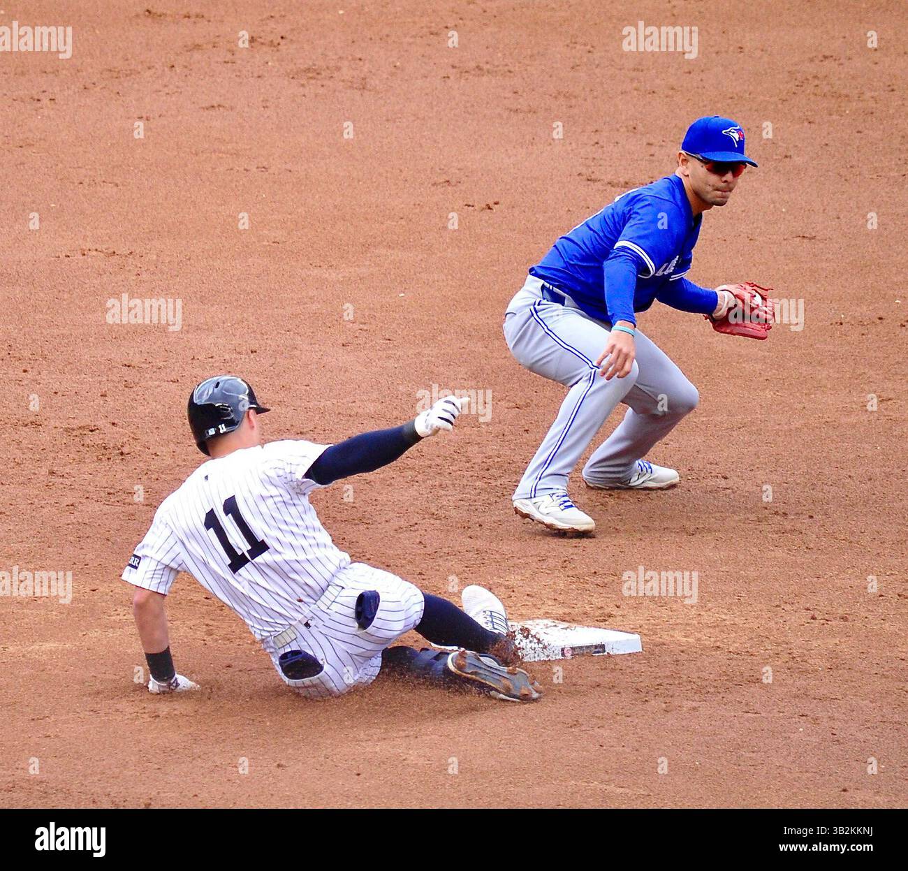 New York Yankees shortstop Anthony Volpe (11) slides into second during a game against the ...