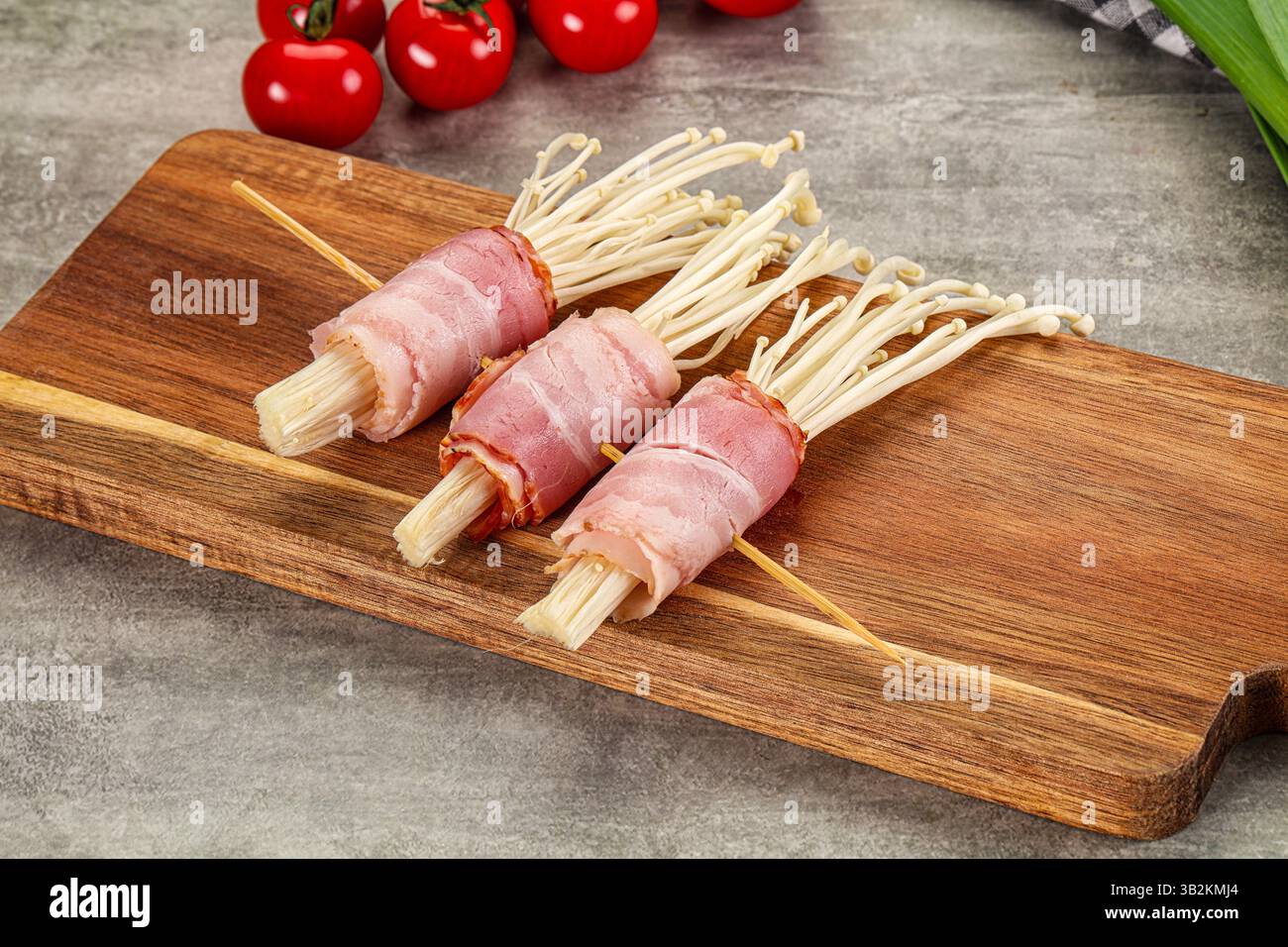 Raw roll with enoki mushroom and bacon Stock Photo - Alamy