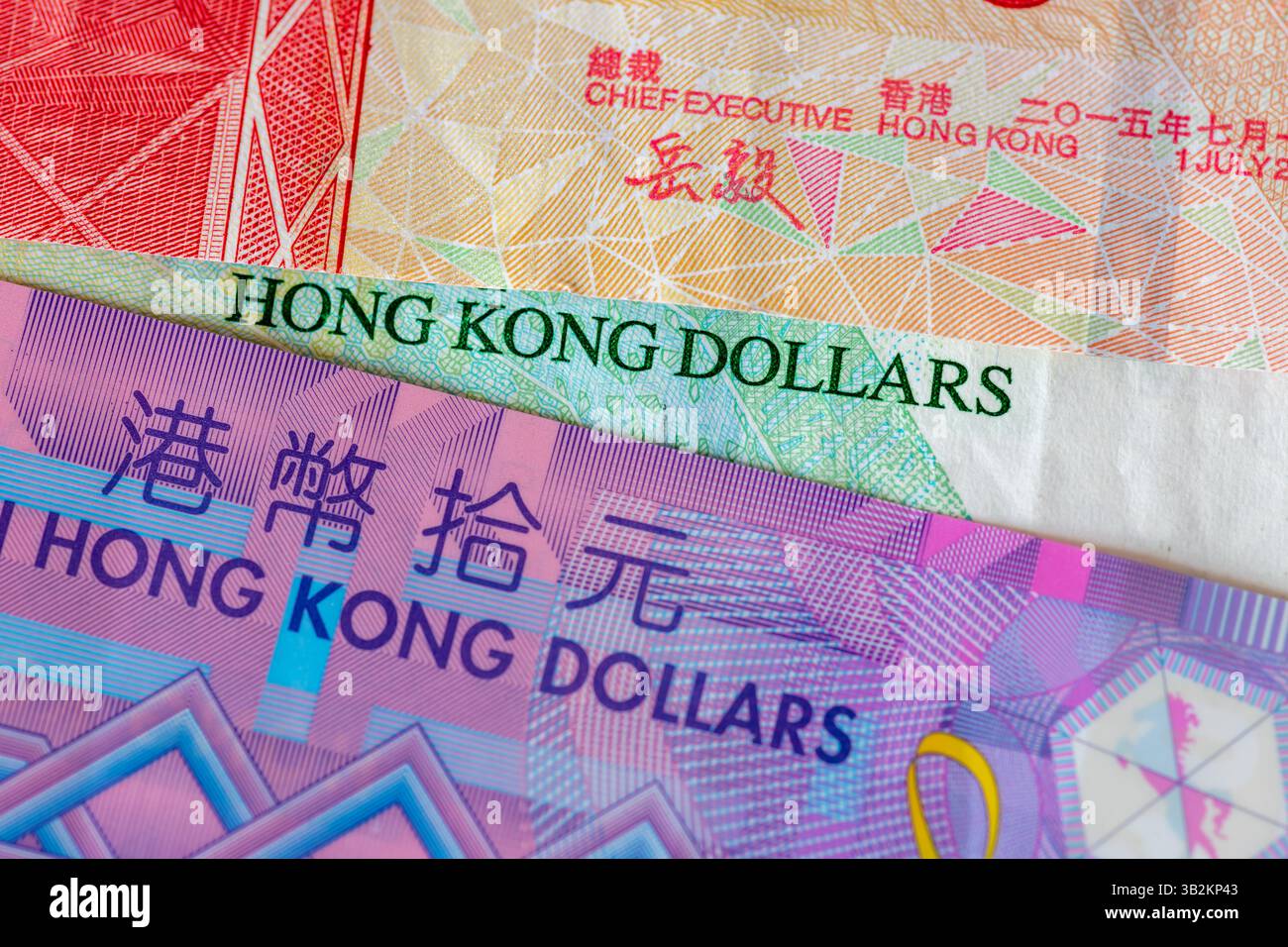 The words Hong Kong Dollars on the bank notes of the Hong Kong Self ...