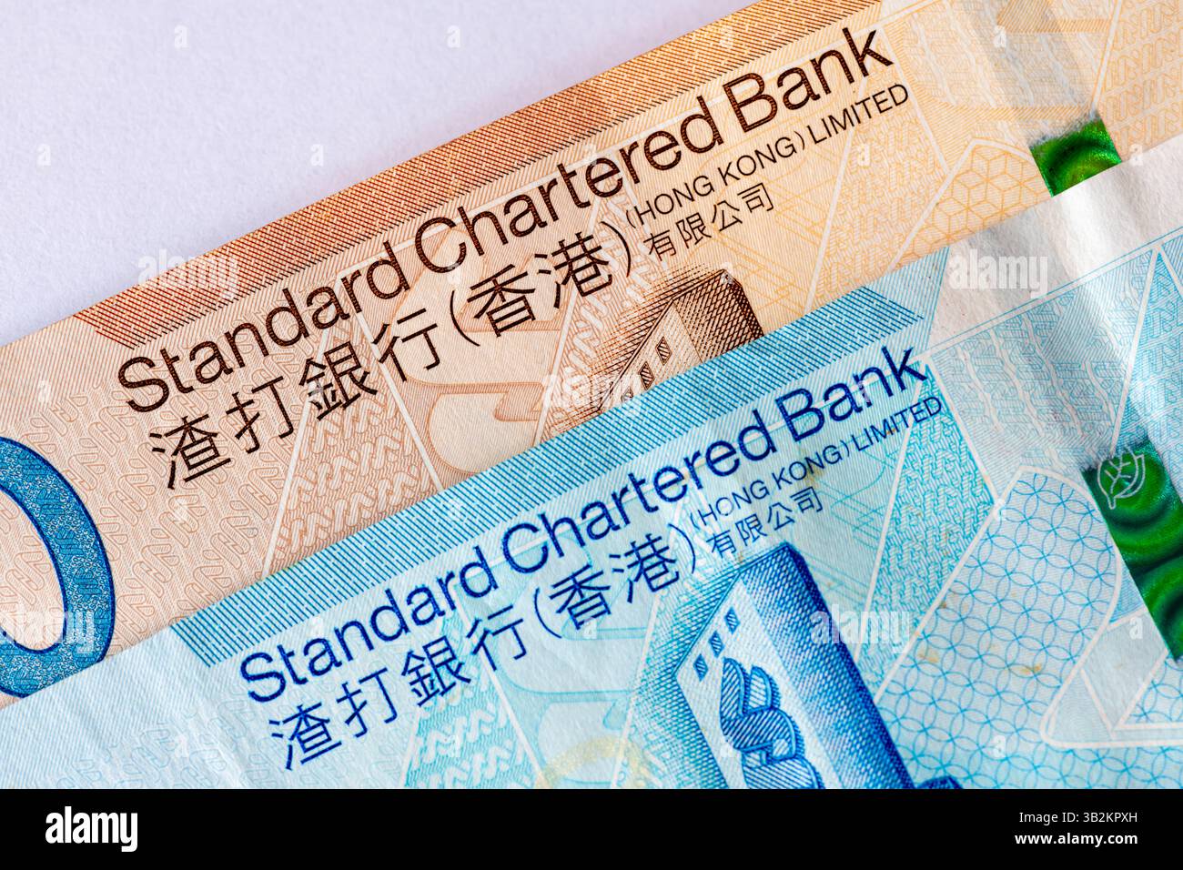 London. UK- 04.27.2025.The name of Standard Chartered Bank as printed ...