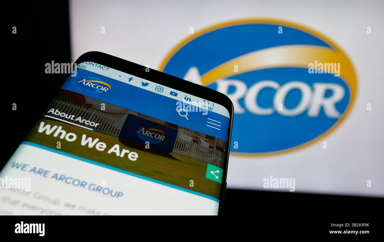 In this photo illustration, a mobile phone with the website of ...