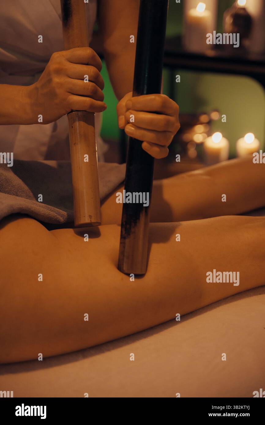 Close up bamboo massage technique hi-res stock photography and images ...