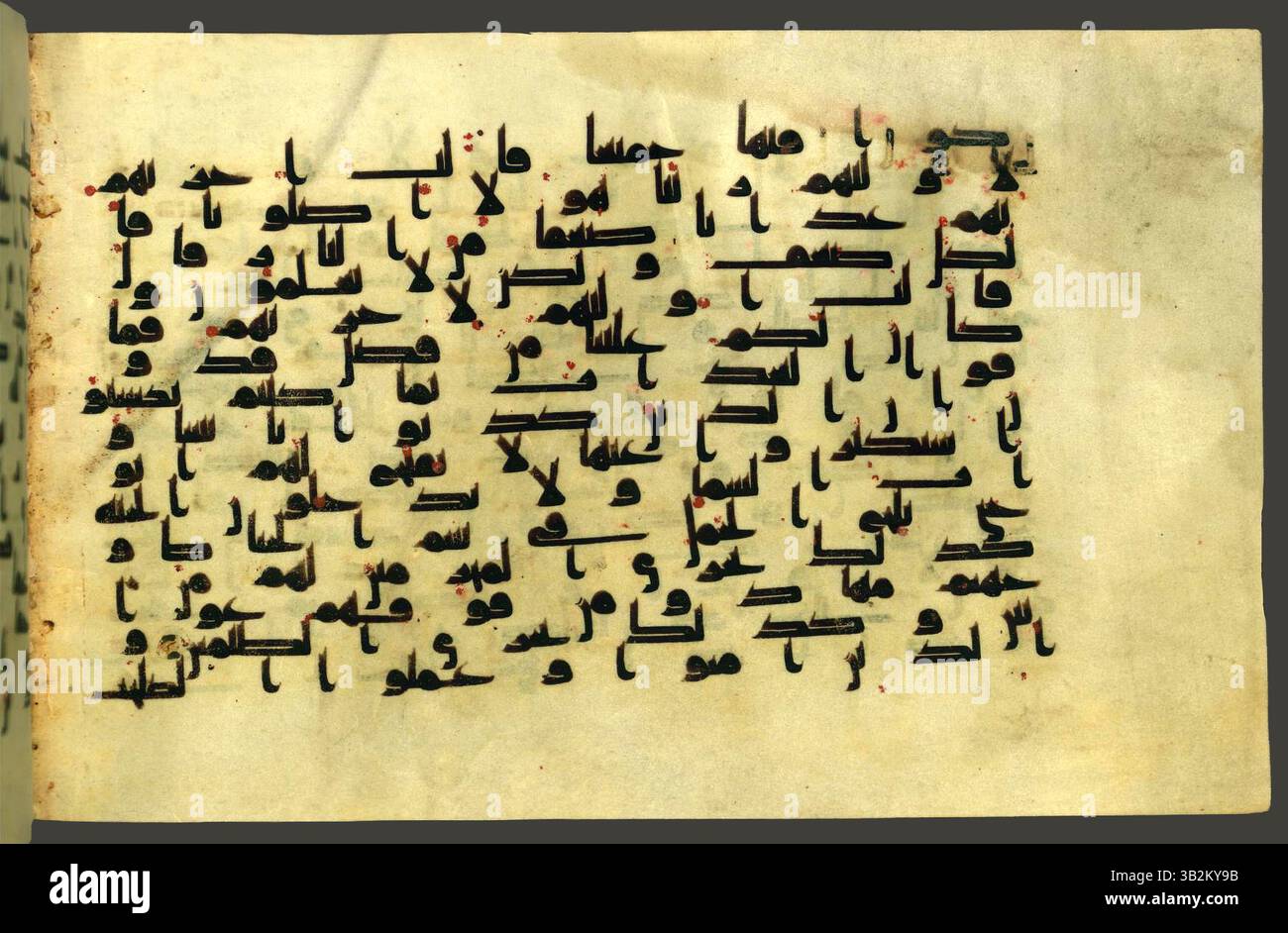 7851. Early Qur'an page in Kufic script, 9th century Stock Photo - Alamy