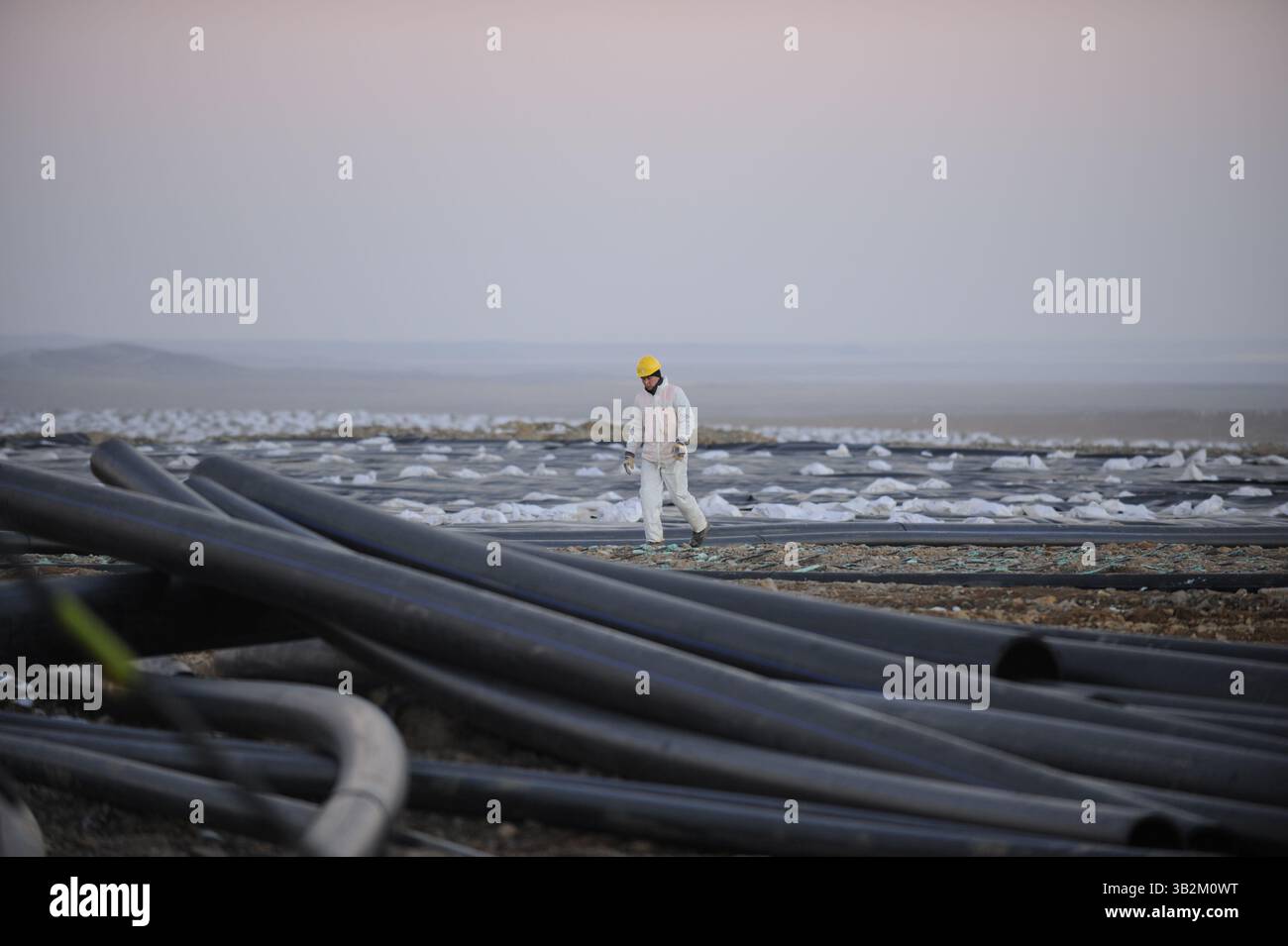 Workers inspect the quarry where cathode copper is extracted Stock ...