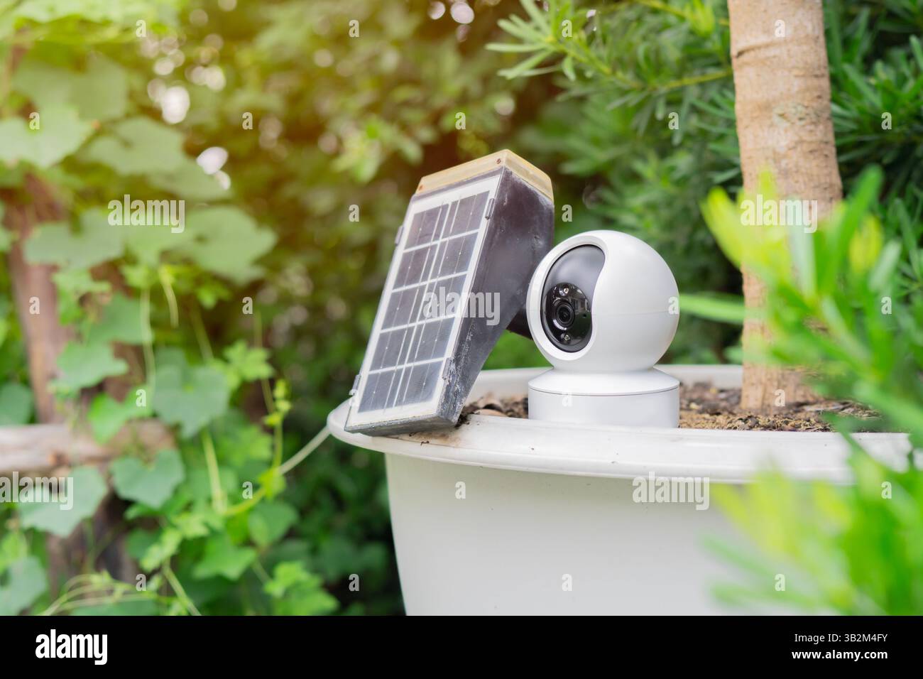 Electricity generator gadget concept. CCTV smart camera and mini solar ...