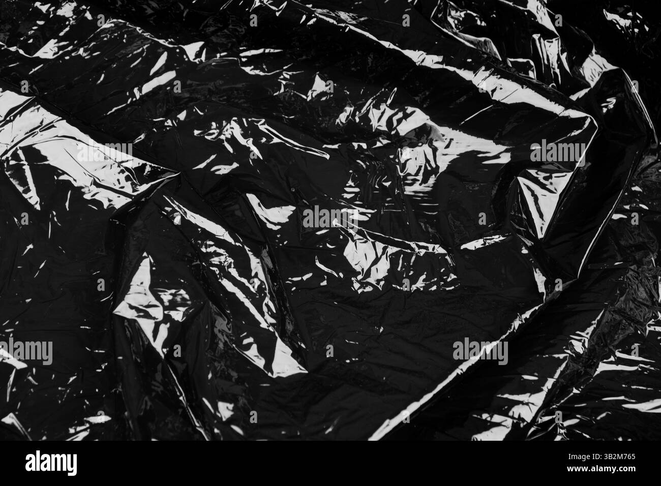 Blank black crumpled plastic foil wrap texture background. Texture of ...