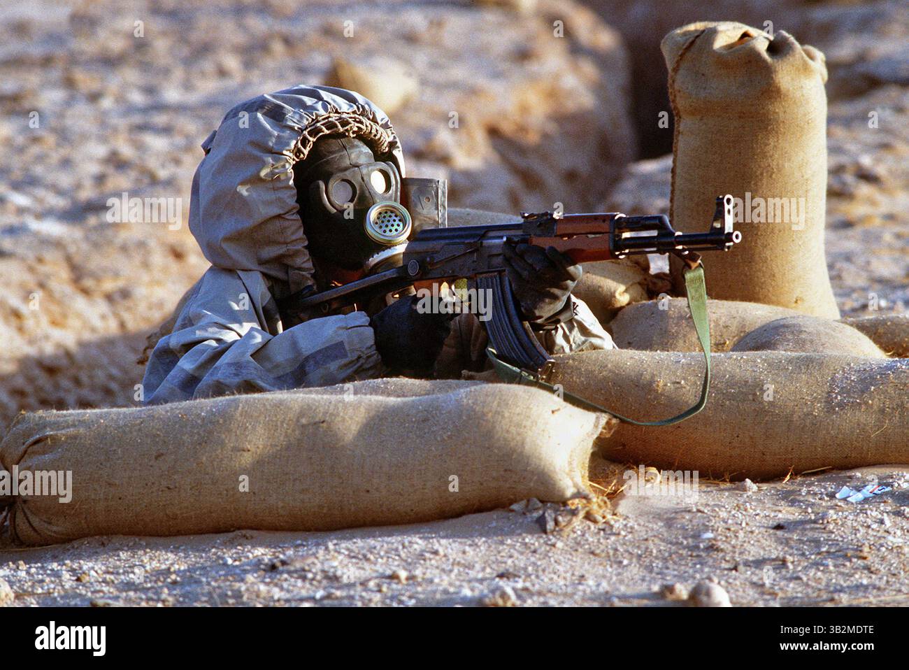 Feb. 14, 1991 - Saudi Arabia - A Syrian soldier aims an AK-47 assault ...