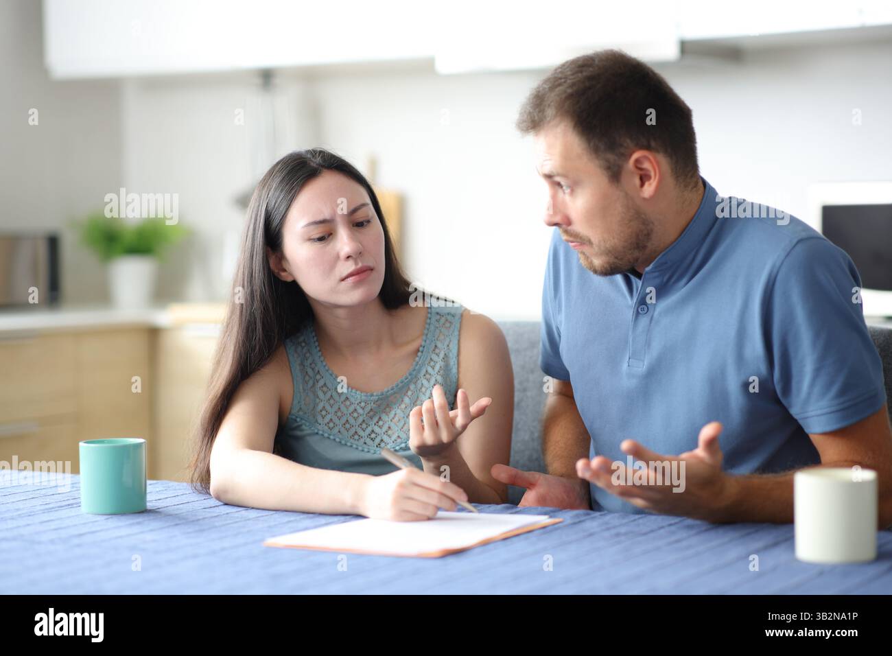 Angry woman asking explanation hi-res stock photography and images - Alamy