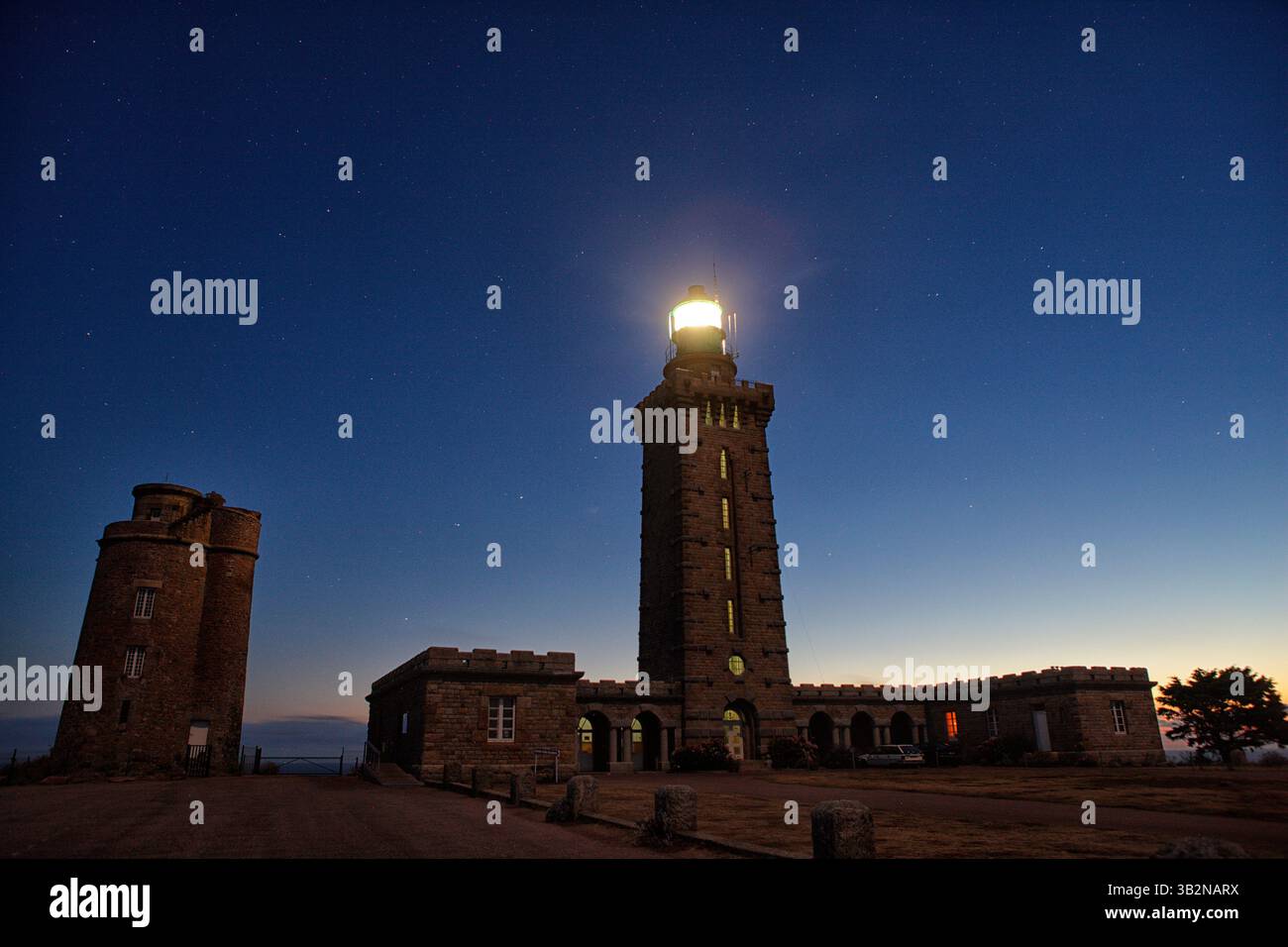 On overnight Lighthouse in Cap Frehel in Brittany, France Stock Photo ...
