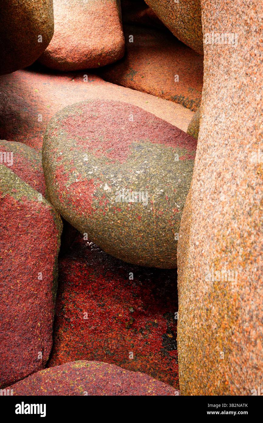Detail of pink granite bowling on the Pink Granite Coast. Ploumanac'h ...