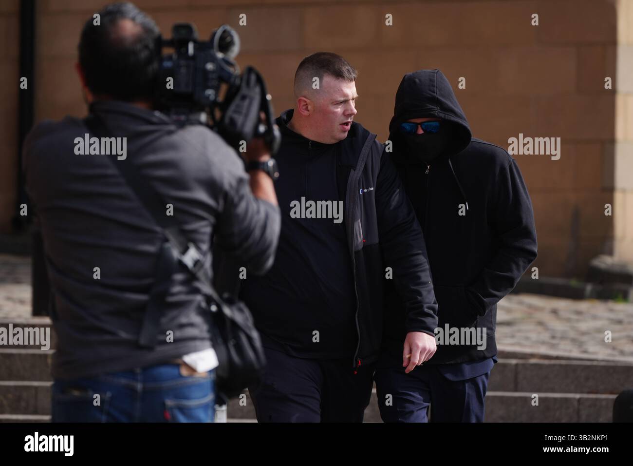 Adam Carruthers (right) arrives at Newcastle Crown Court where he is ...