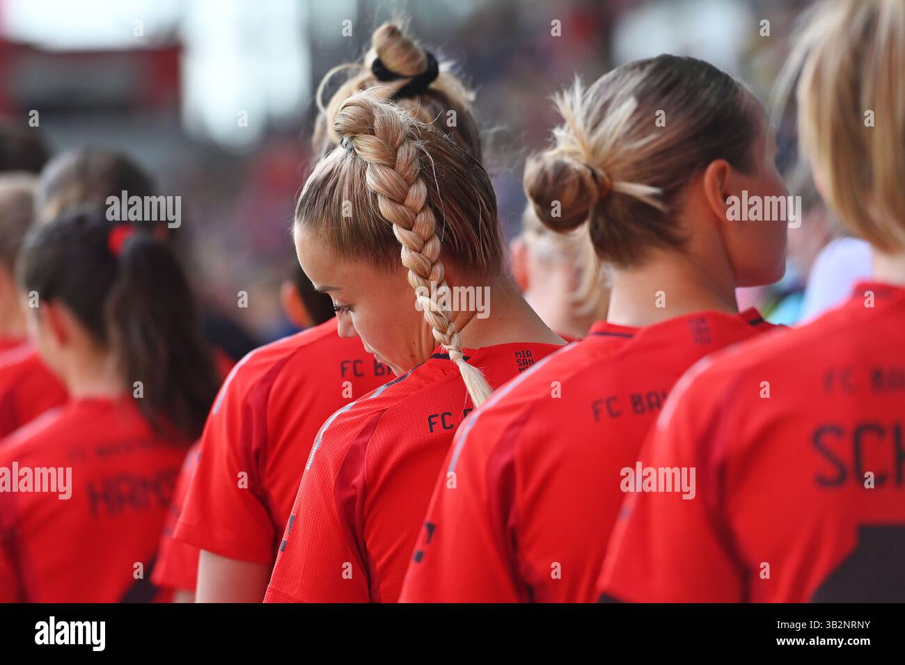 Munich, Deutschland. 27th Apr, 2025. Border motif, symbolic photo of women's football, hair ...