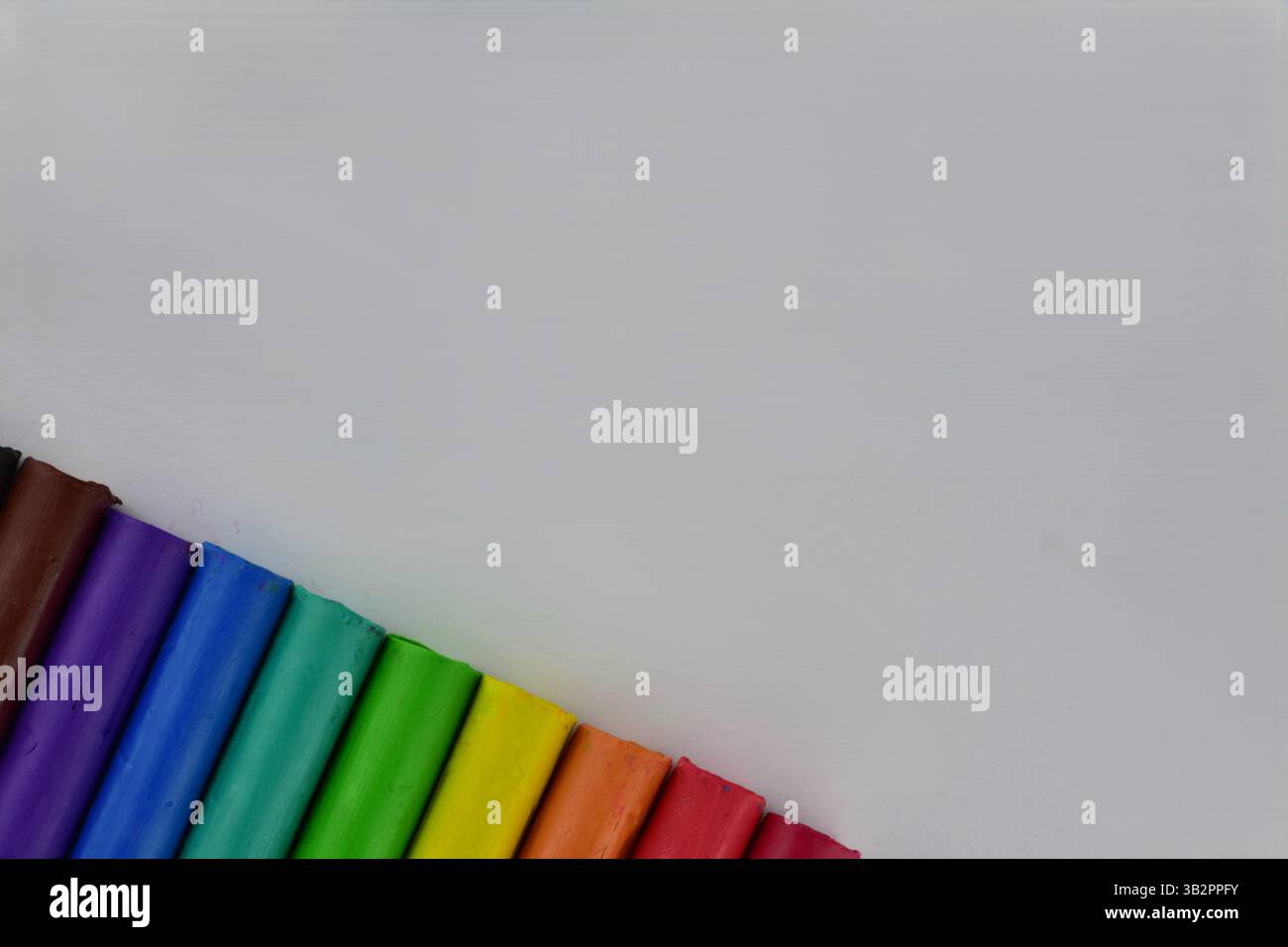 Colorful clay sticks play dough plasticine vibrant colors in a row on ...