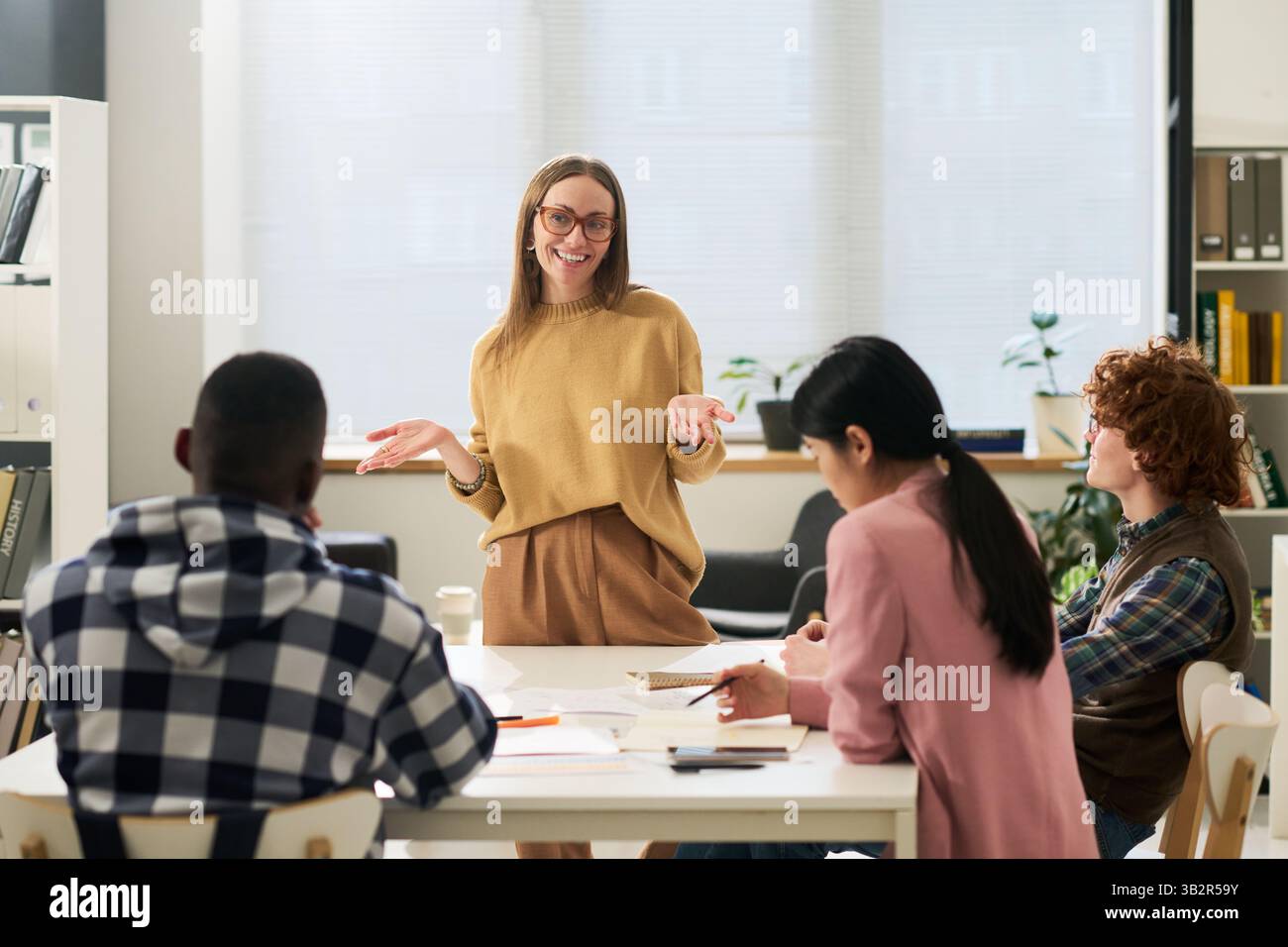 Educator Teaching Foreign Languages to Diverse Classroom Group Stock ...