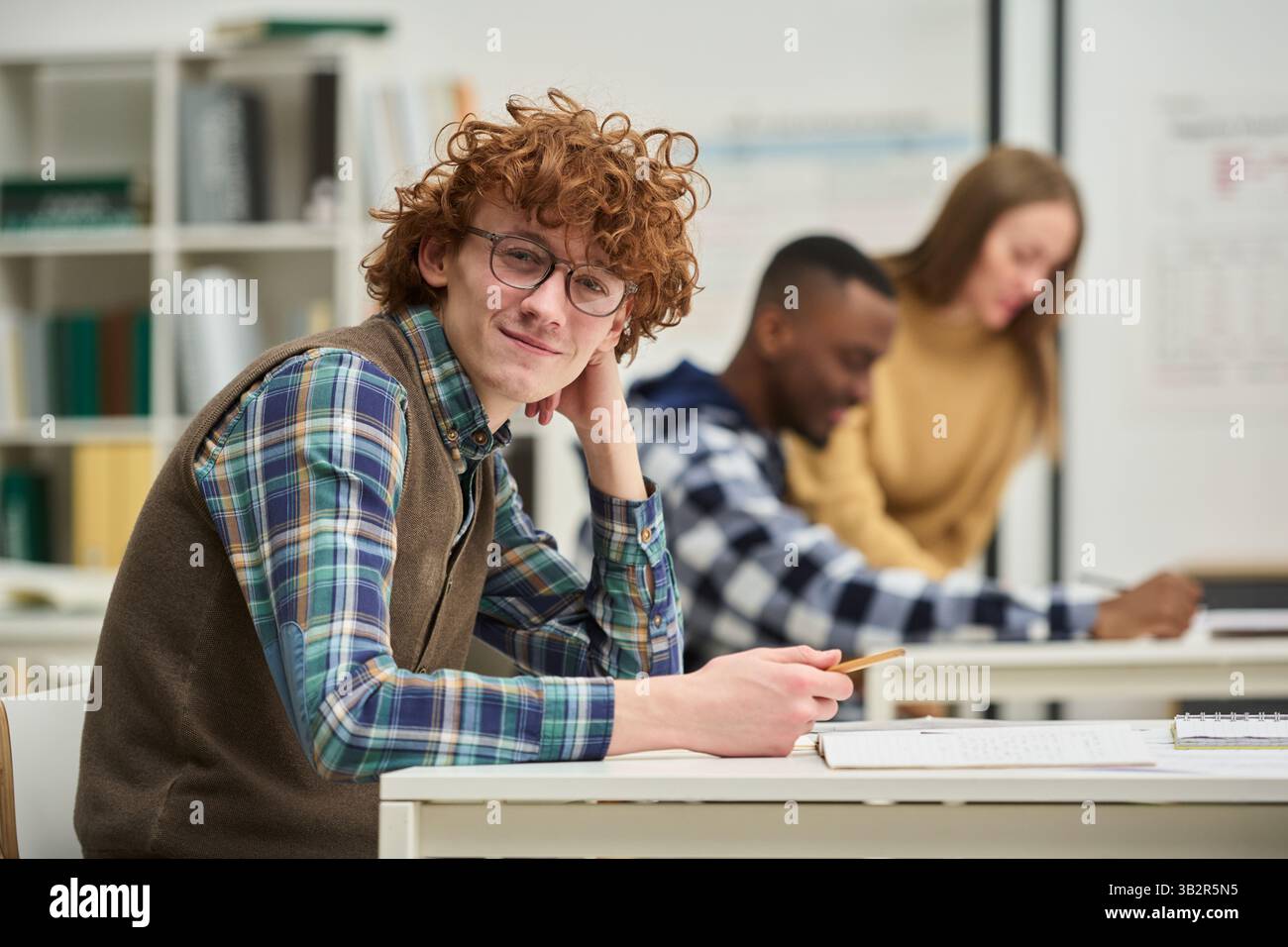 Studying Foreign Languages in Classroom with Focused Students Stock Photo - Alamy