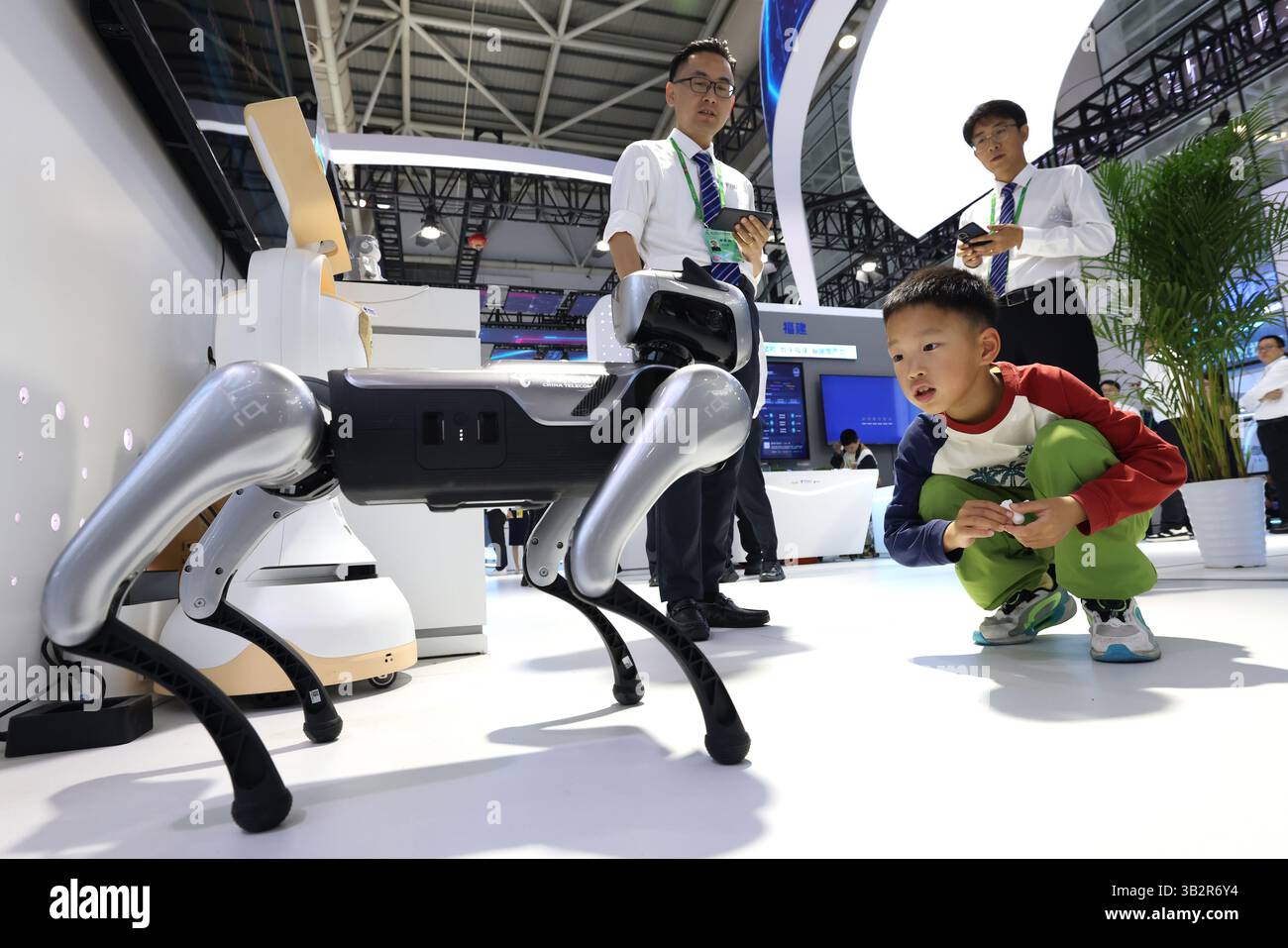 FUZHOU, CHINA - APRIL 28, 2025 - Children interacted with an ...