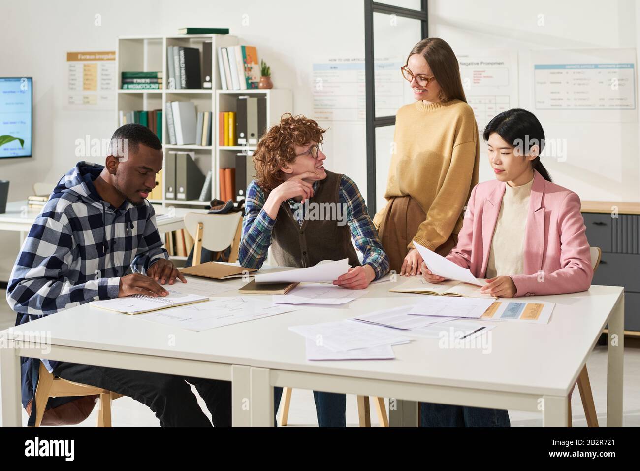 Diverse Group of Students Studying in Classroom Stock Photo - Alamy