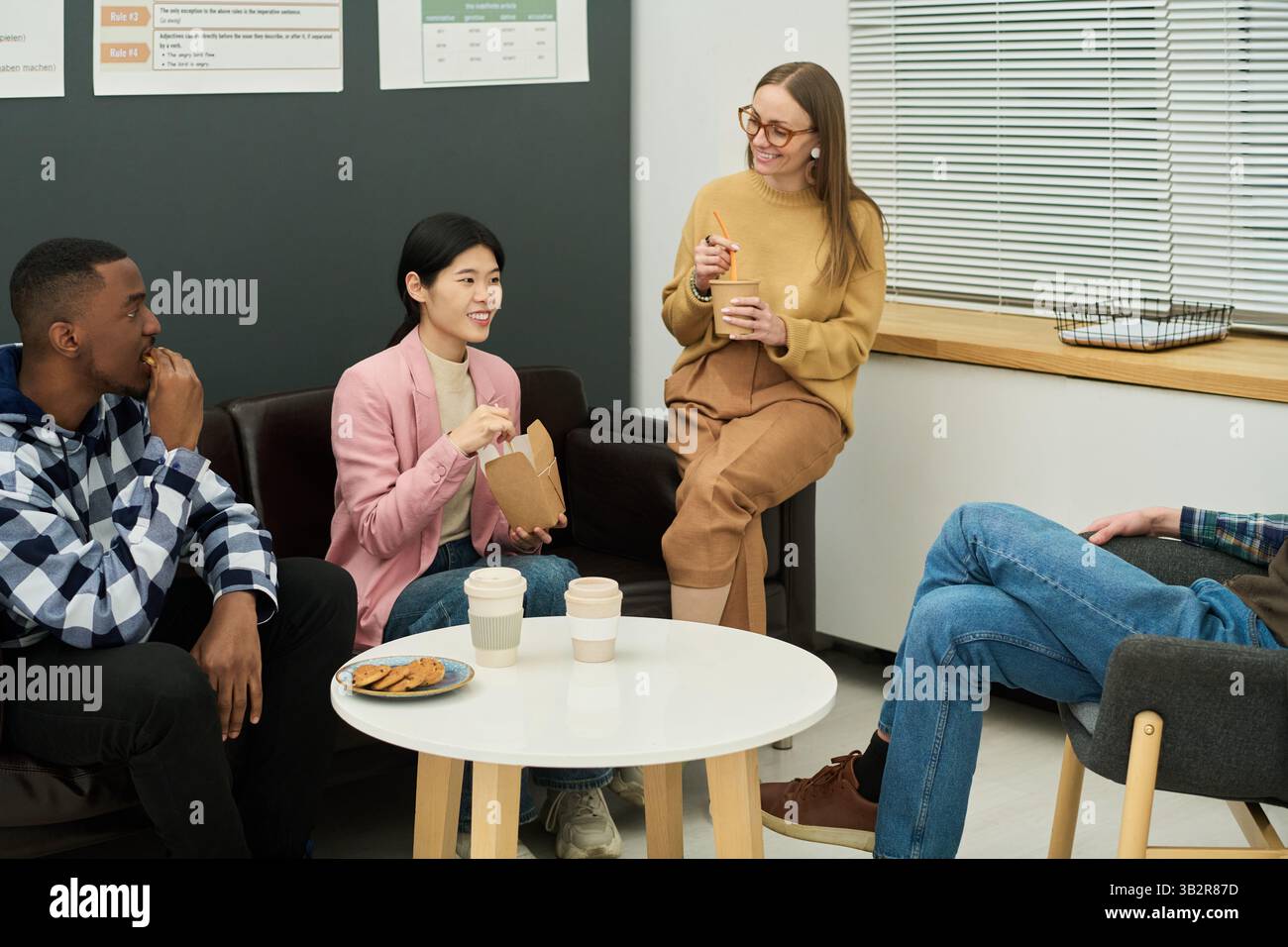 Smiling Students Studying Foreign Languages in Classroom Stock Photo ...