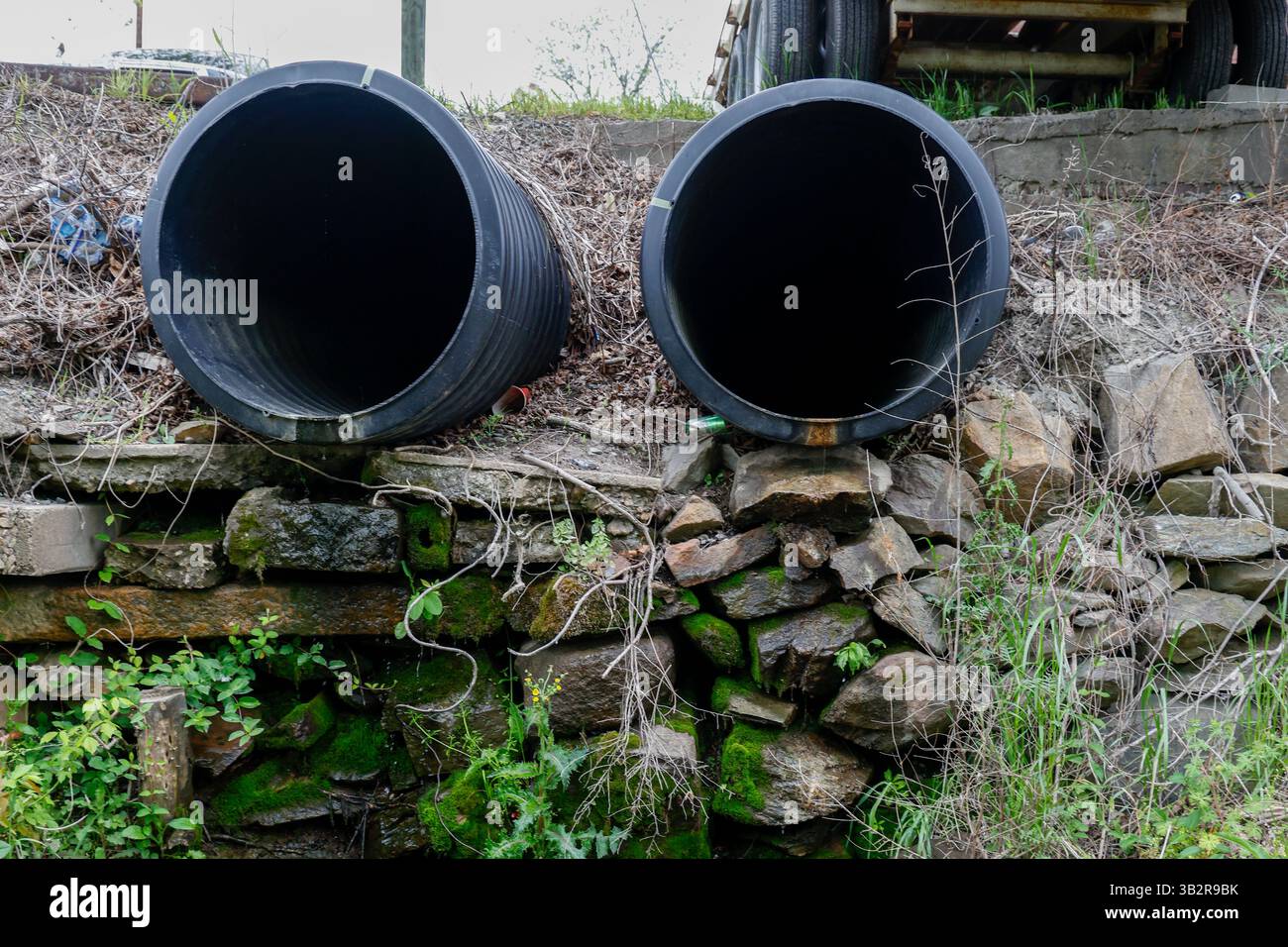 Storm water runoff pipes are seen in downtown Mount Pleasant, N.C., on ...