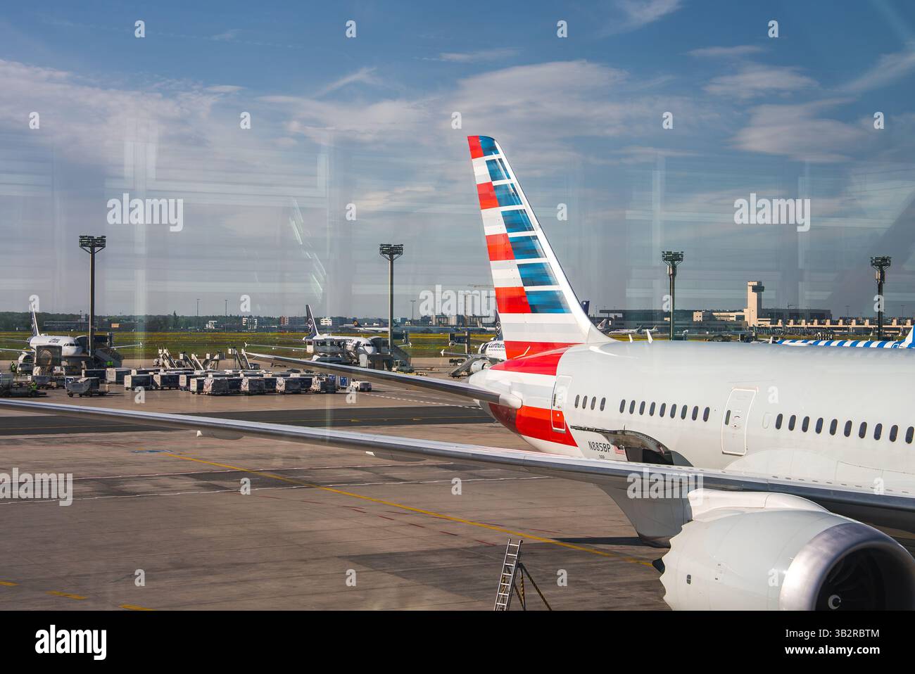 Airplane with Striped Tail on Tarmac at Frankfurt Airport Stock Photo ...