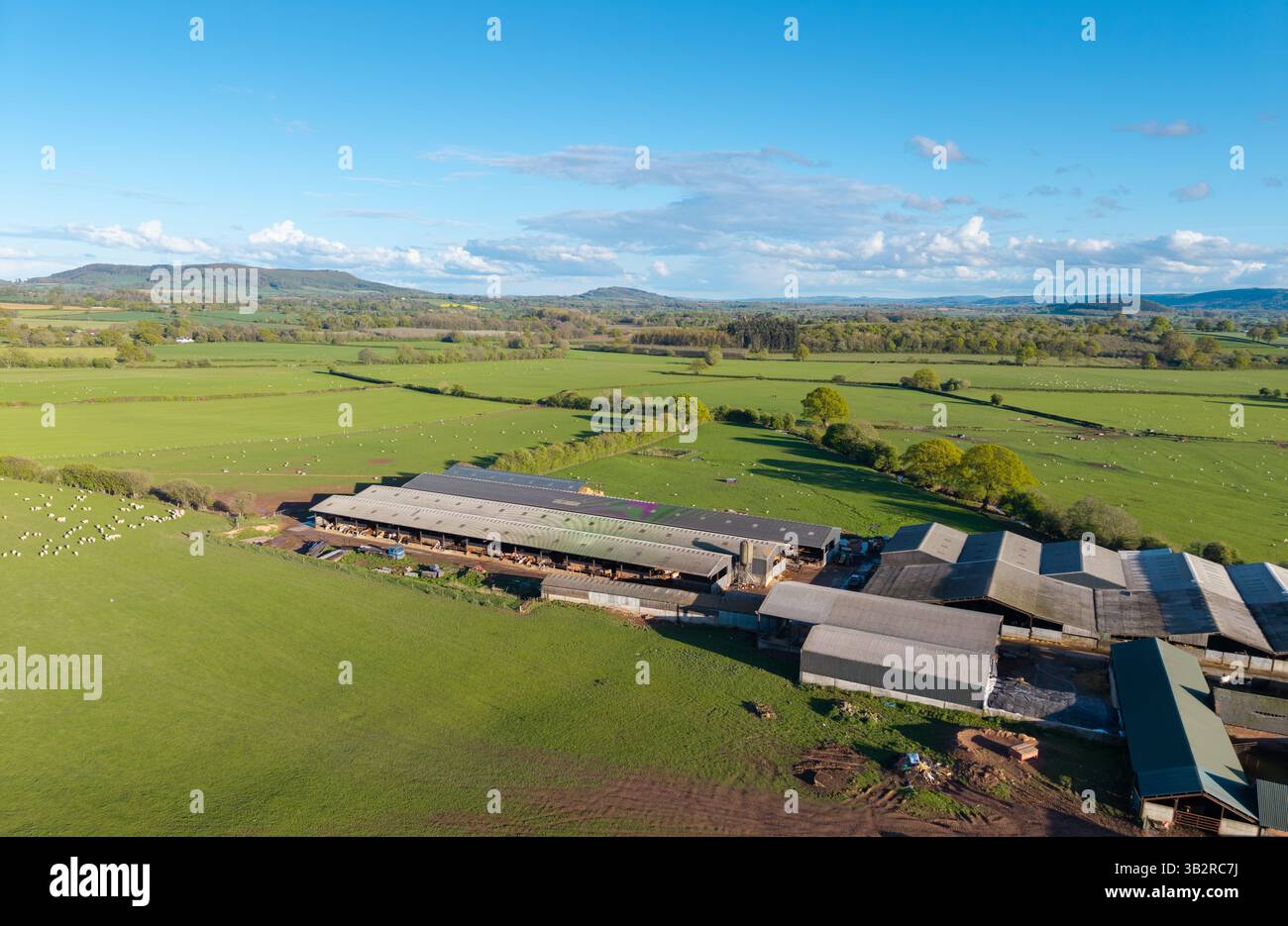 Farmstead with lots of cattle sheds and flat farmland in the Wye Valley ...