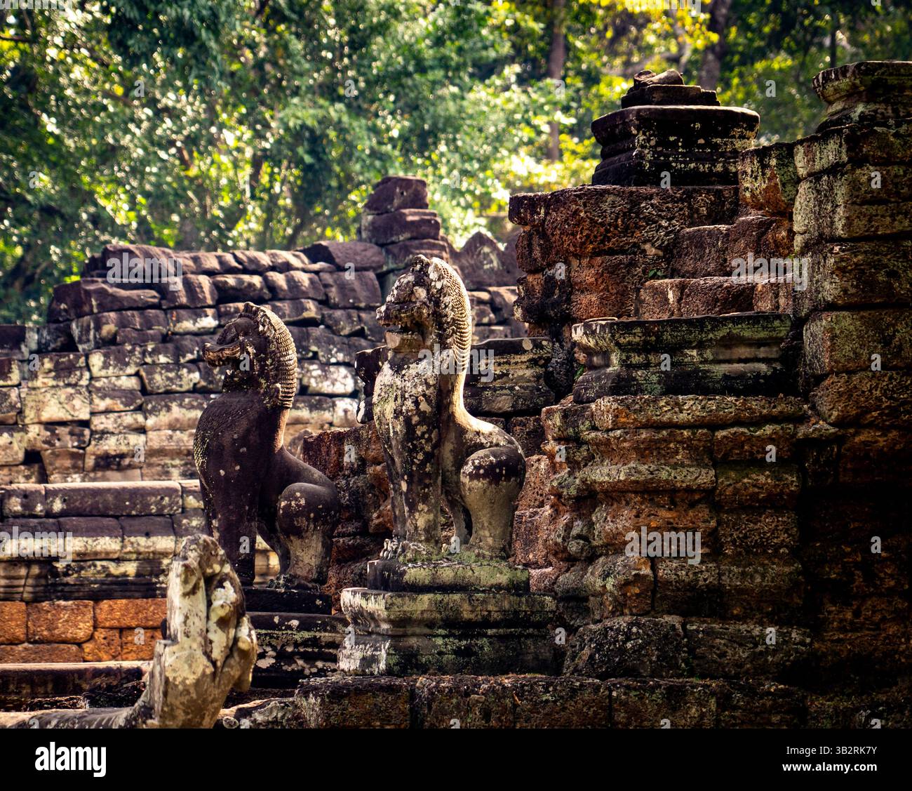 Ancient stone sculptures of mythical creatures at a historical temple ...