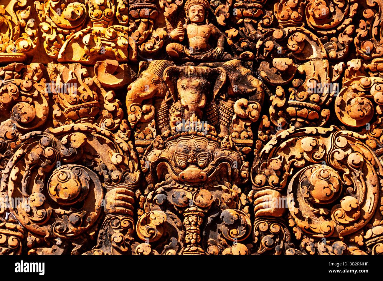 Intricate stone carvings depicting deities and ornate patterns ...