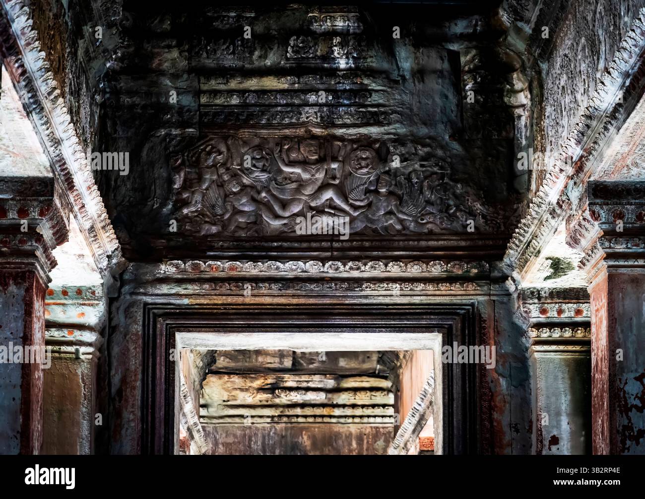 An ancient temple interior showcasing intricate stone carvings on the ...