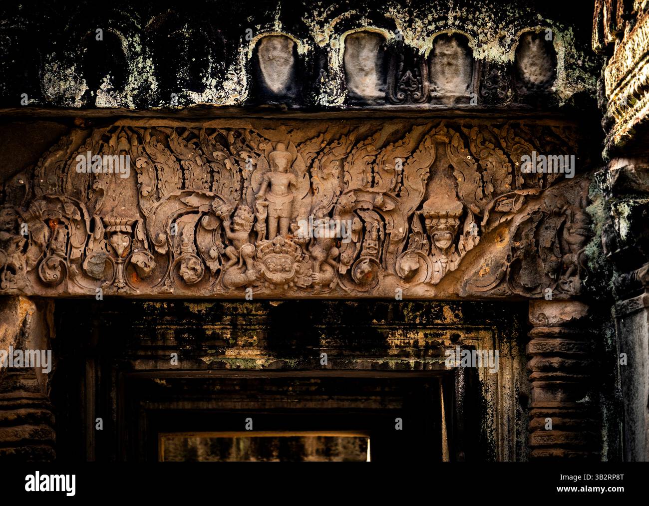 Intricate stone carvings depicting deities and mythical figures on an ...