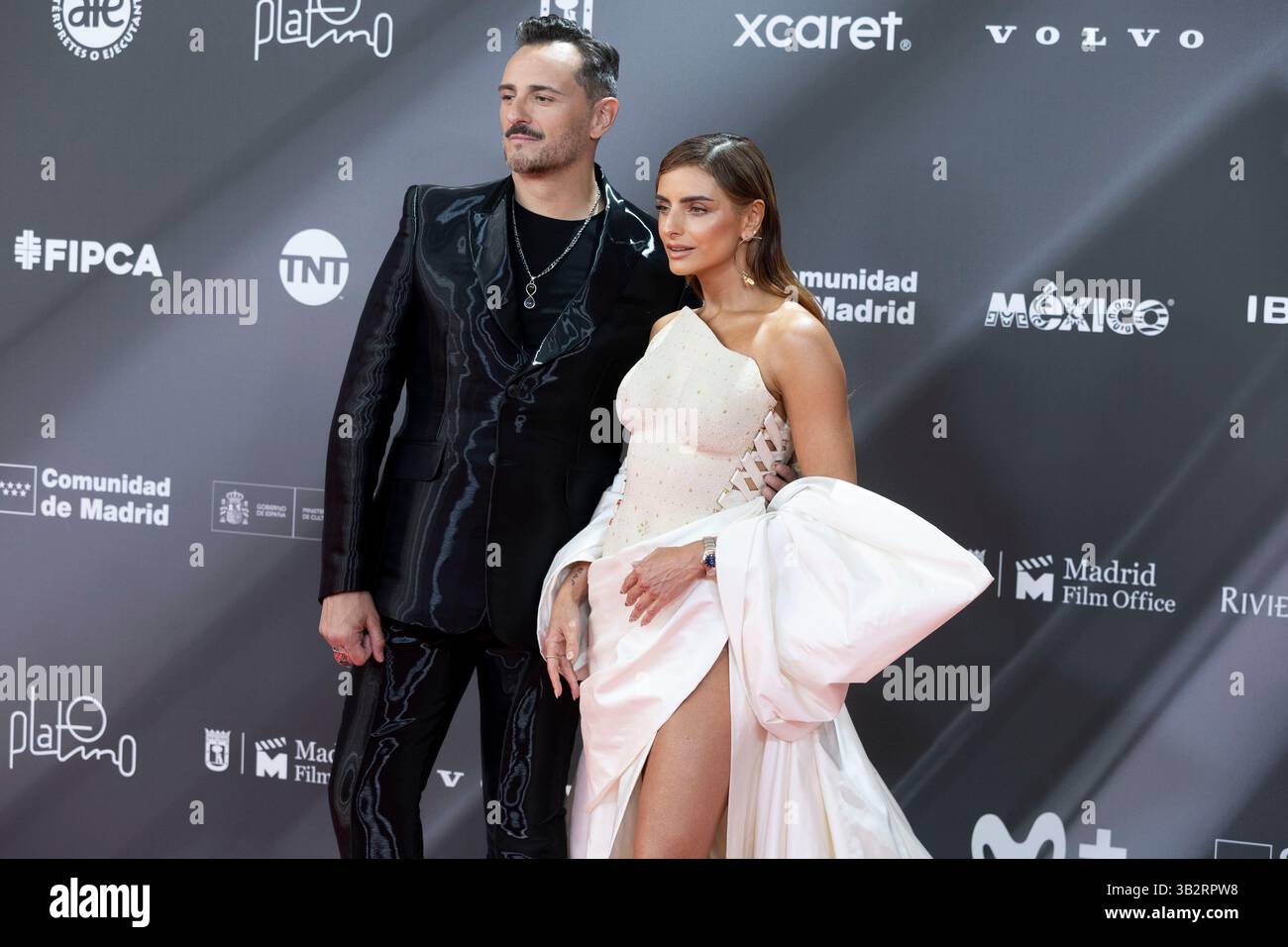 Asier Etxeandia and Aislinn Derbez attended Platino Awards 2025 red carpet at Palacio Municipal ...