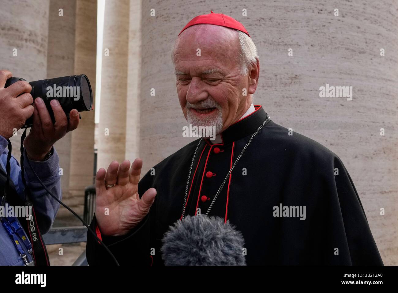 Cardinal Vicente Bokalic Iglic, from Argentina, is approached by ...