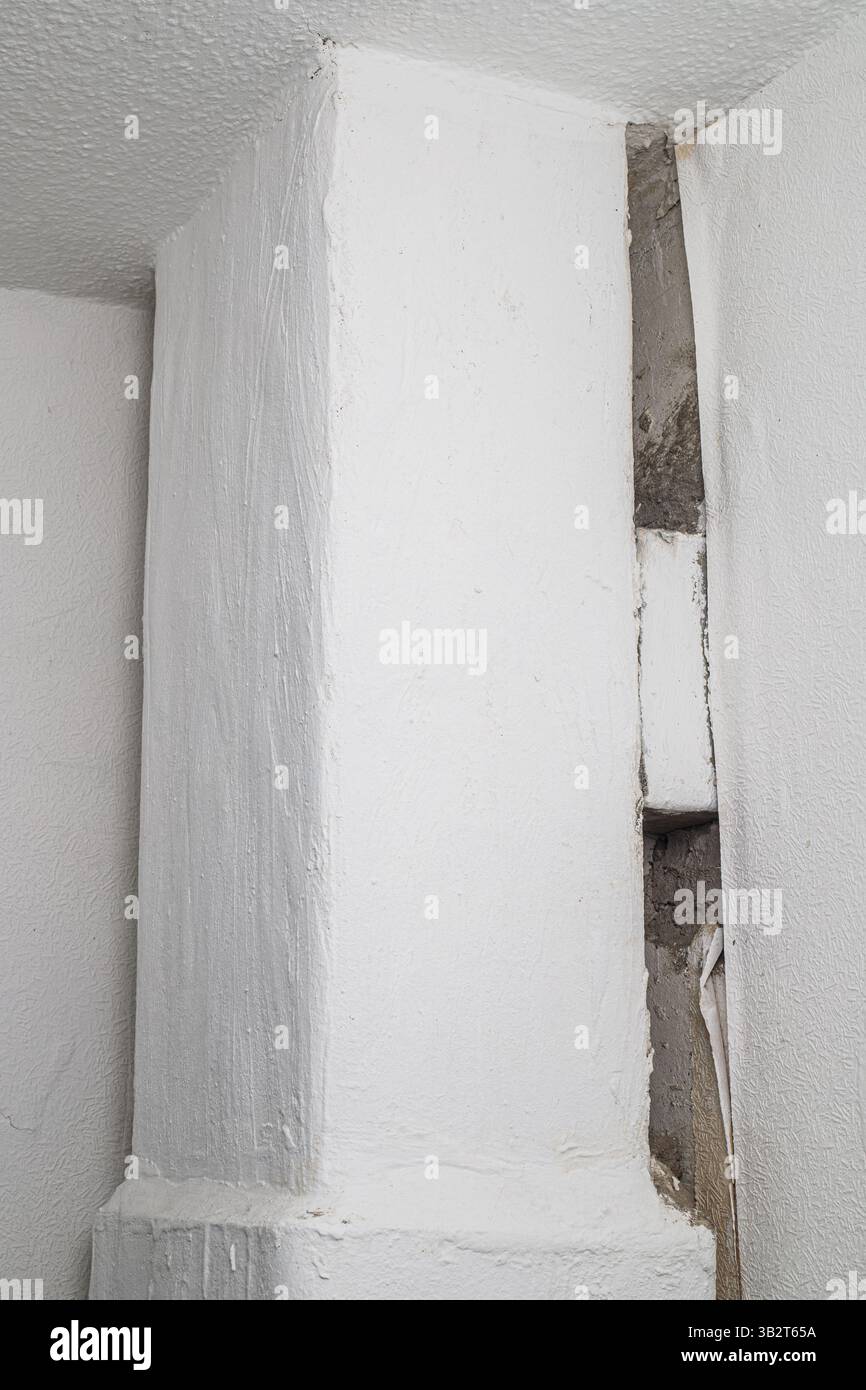 Wall Crack and Construction Defect in White Plastered Wall Stock Photo ...
