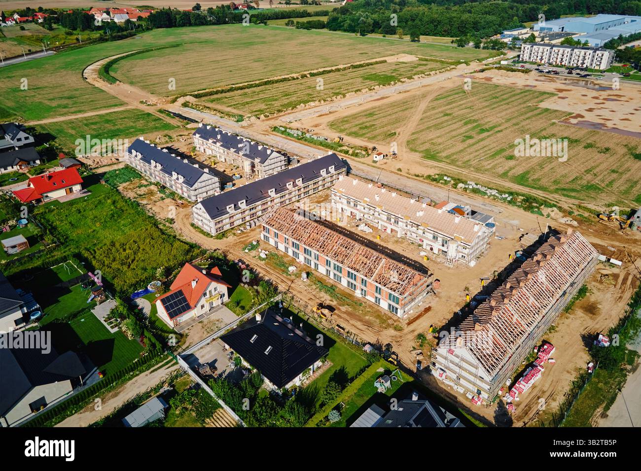 Aerial view of large housing estate under construction with modern ...