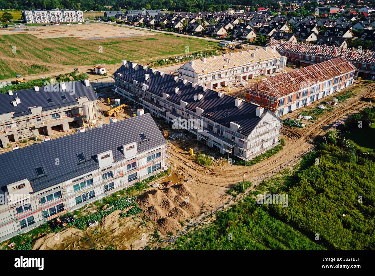 Aerial view of large housing estate under construction with modern ...