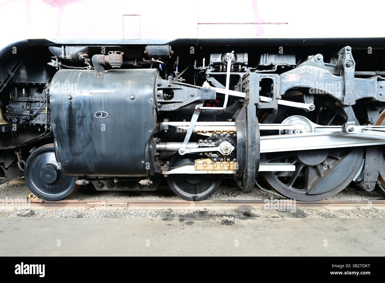 Pushrods and drive shafts of an antique American stream locomotive ...