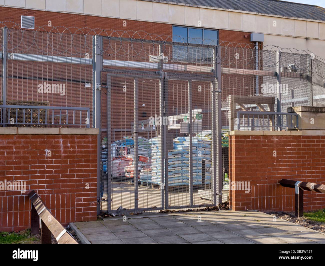 Razor wire fence and wall protecting garden centre in Parc Llandudno ...