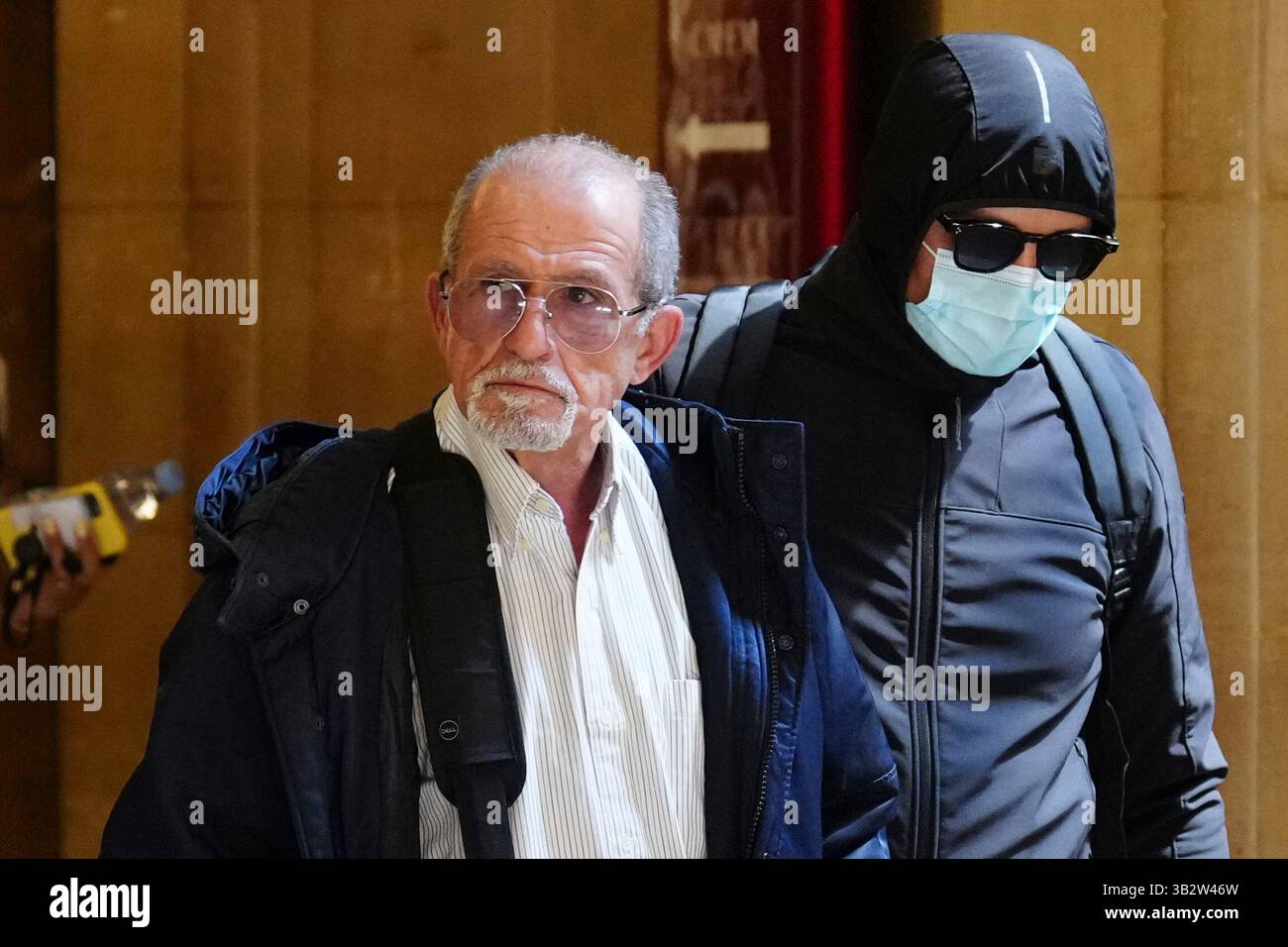 Defendant Aomar Aït Khedache, left, one of the men accused in the 2016 ...