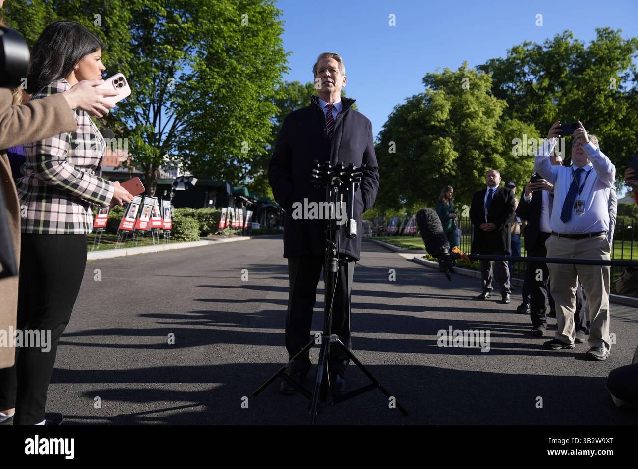 Treasury Secretary Scott Bessent speaks with reporters outside the ...