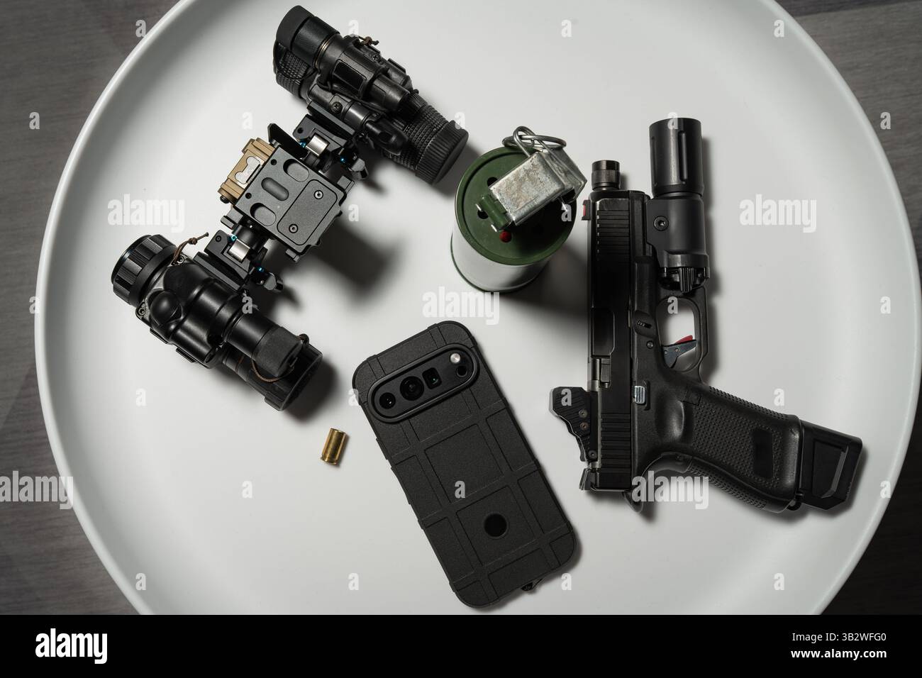Tactical gear and modern means: pistol, grenade, night vision device ...