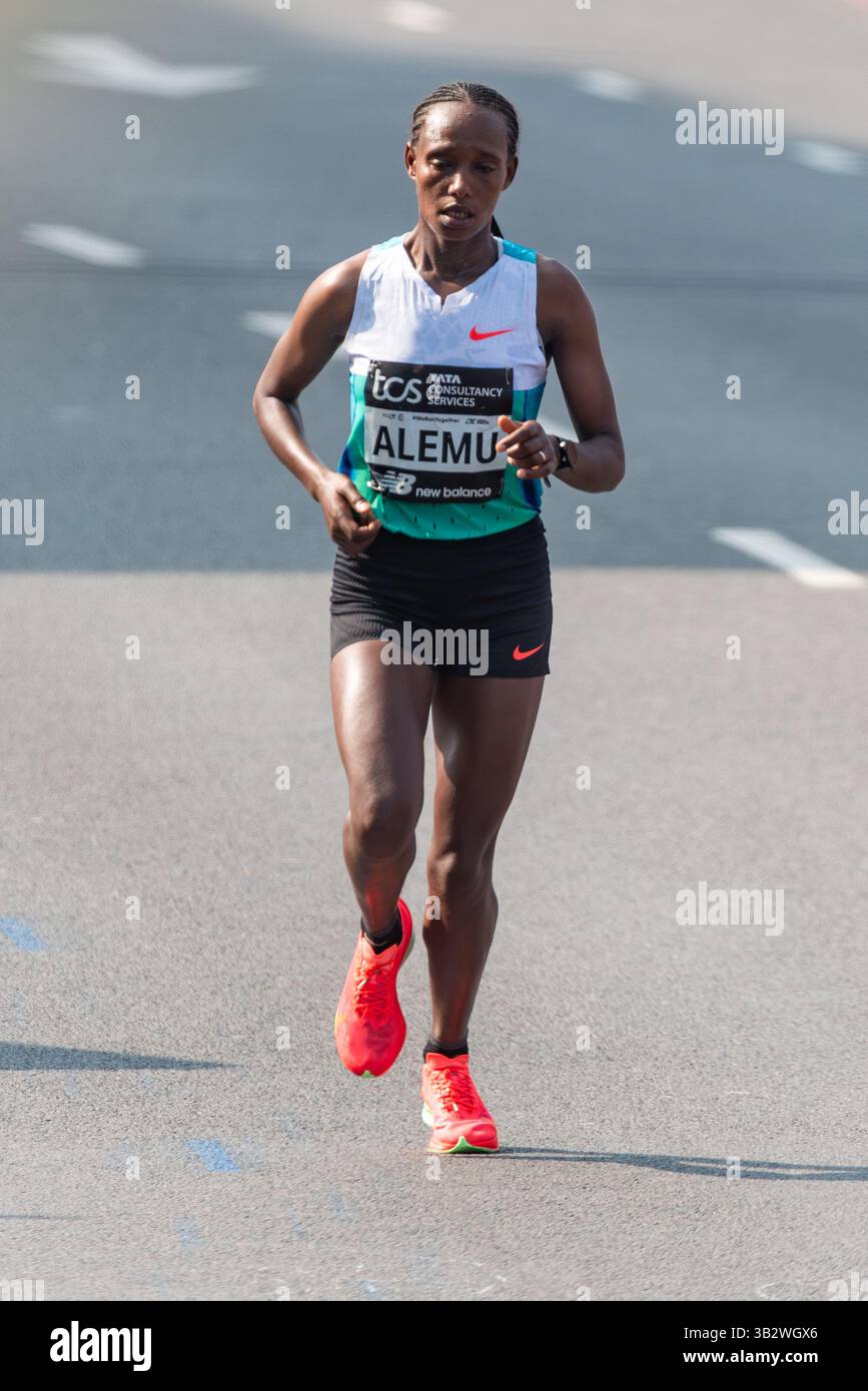 Alemu Megertu, female athlete competing in the 2025 TCS London Marathon ...