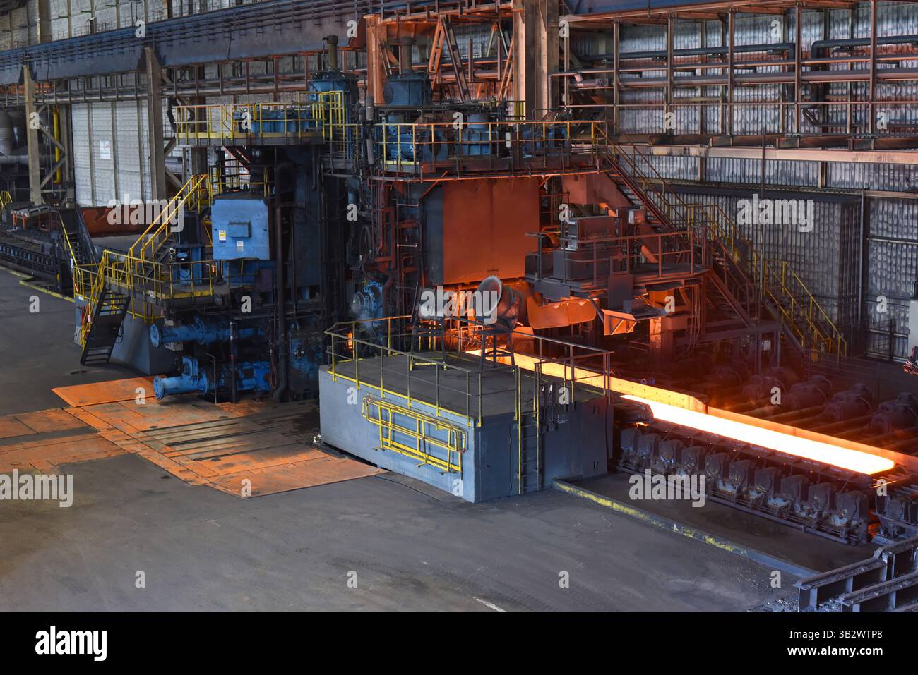 machine with conveyor belt with glowing metal frame in the production ...