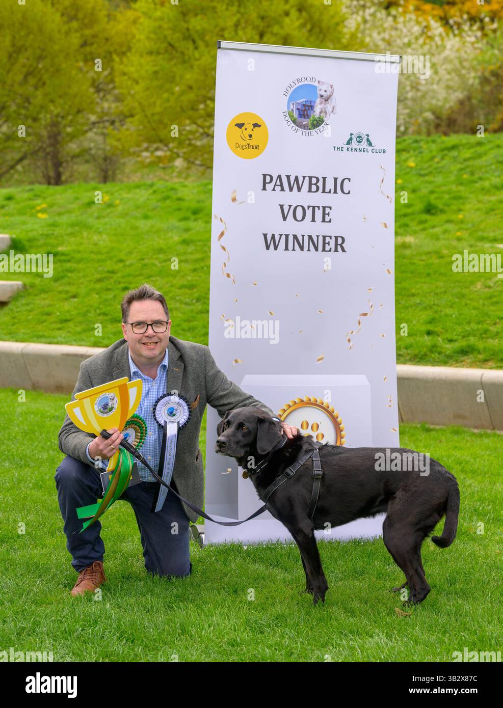 EDITORIAL USE ONLY The 'pawblic' vote winner, Craig Hoy MSP with Roma ...