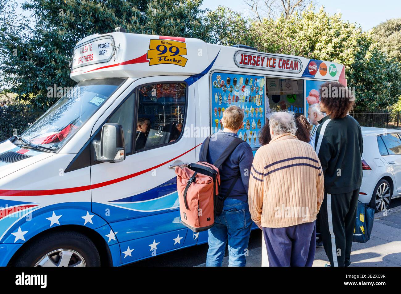 Customers queueing at an ice cream van outside Clissold Park in Stoke ...