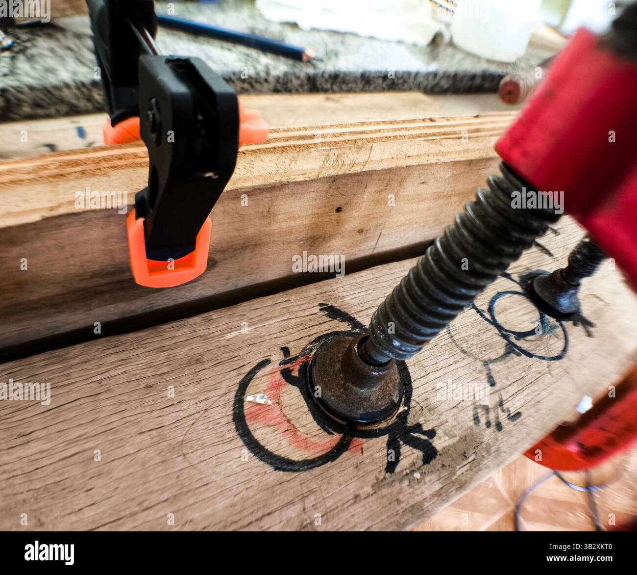 Set of clamps for gluing wood Stock Photo - Alamy