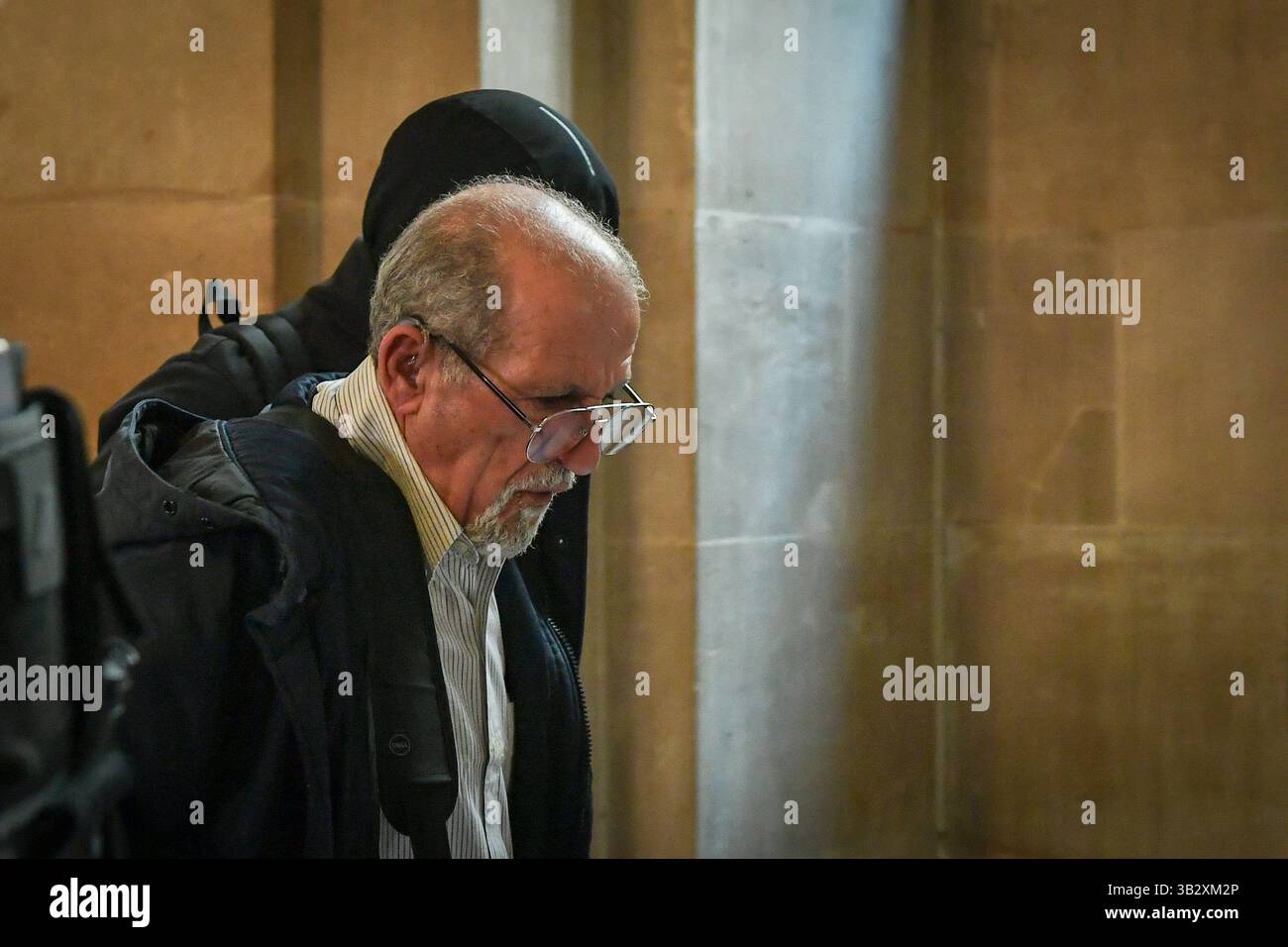 Defendant Aomar Ait Khedache arrives at the Paris Courthouse for the ...